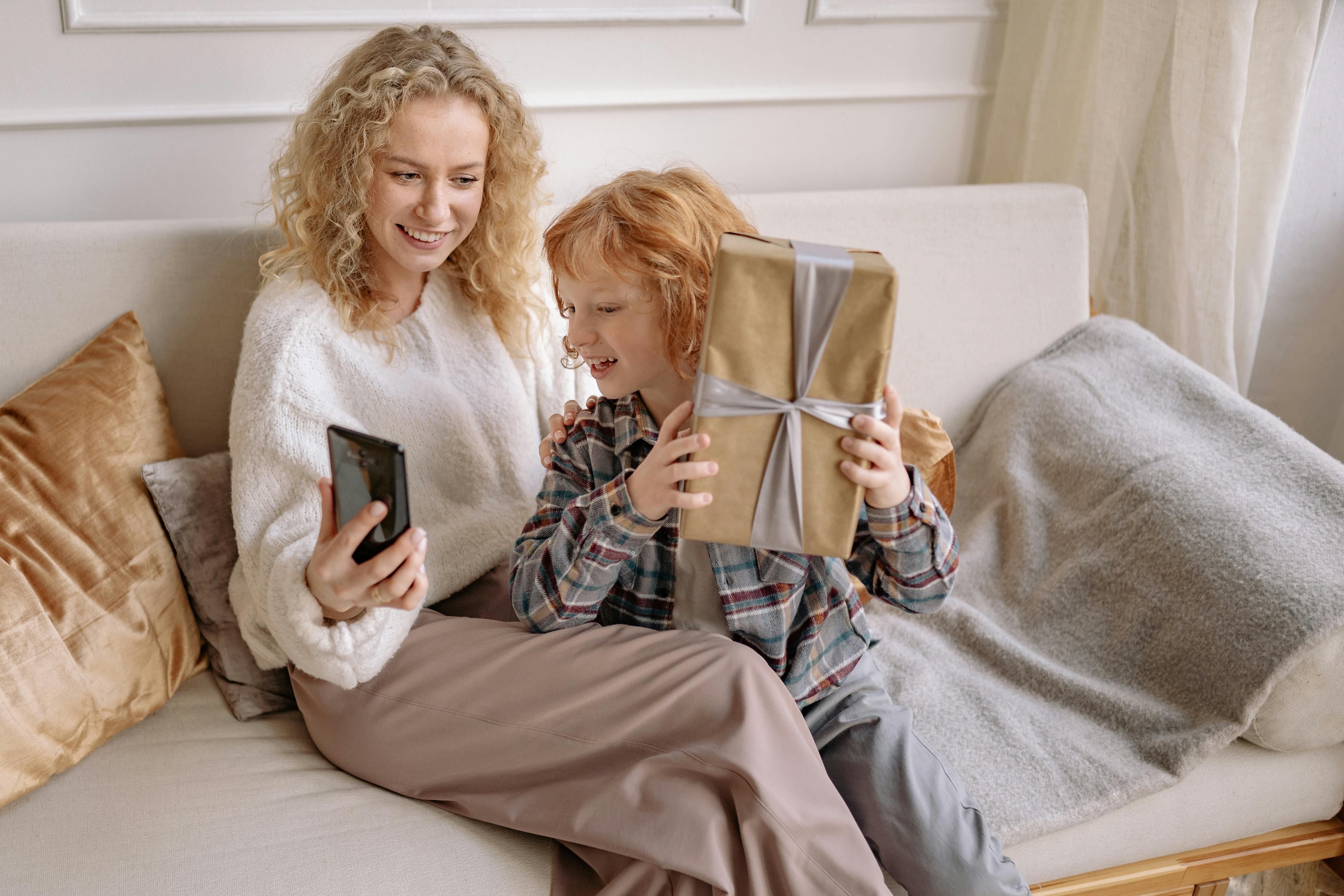 2 Girls Sitting on Chair · Free Stock Photo