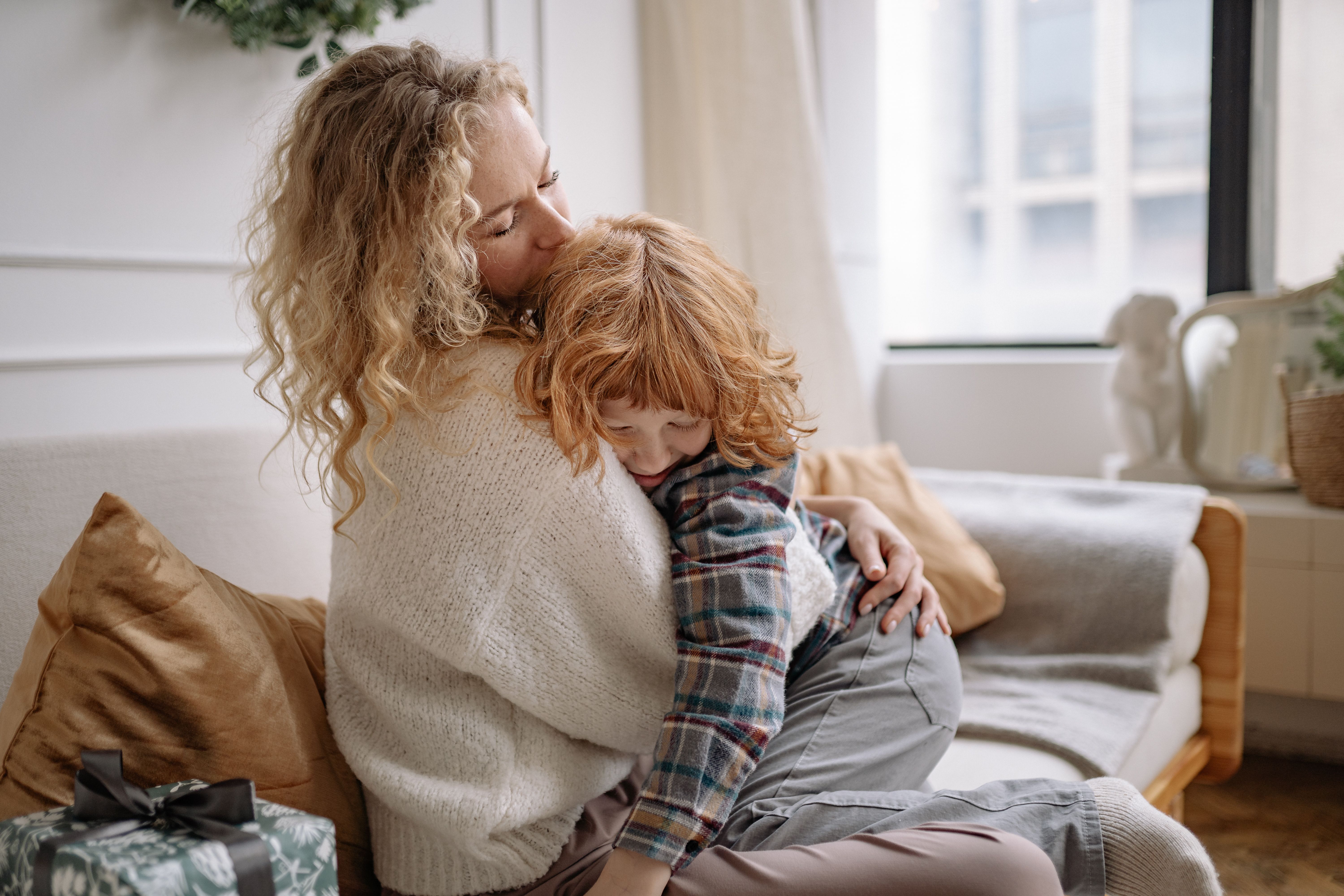 Boy Hugging His Mom · Free Stock Photo