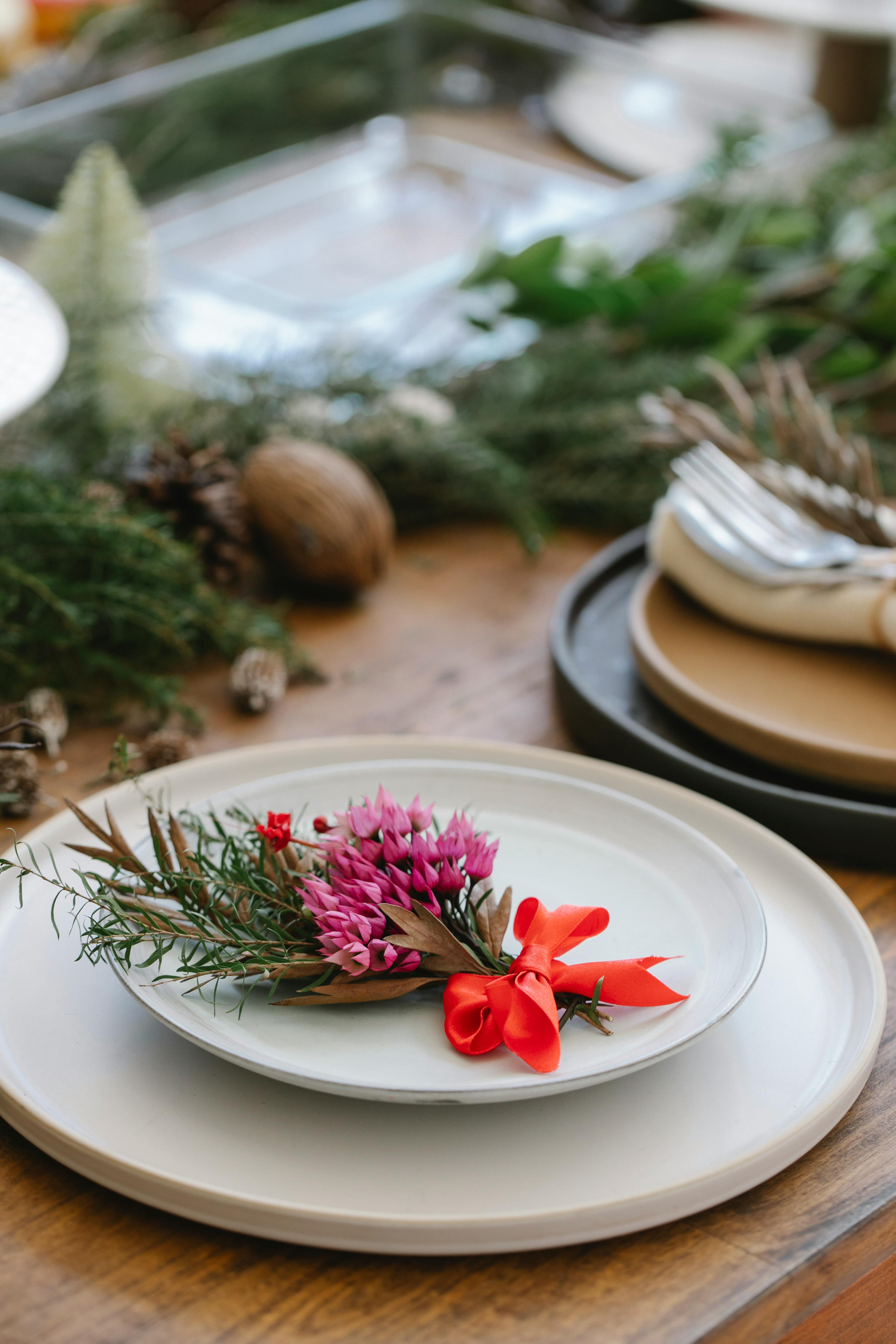 Table setting with plates and branches · Free Stock Photo