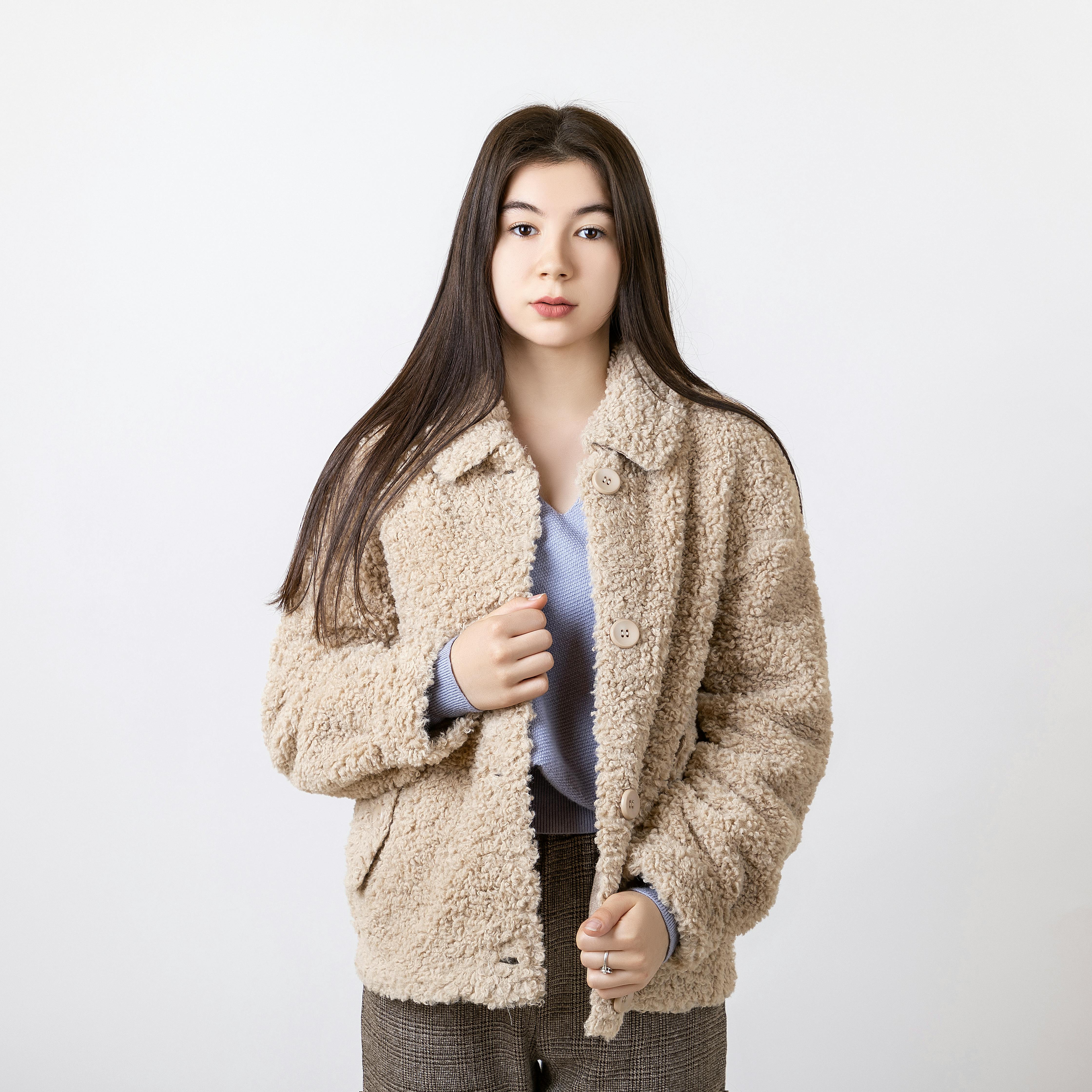 Portrait of a Woman on a White Background · Free Stock Photo