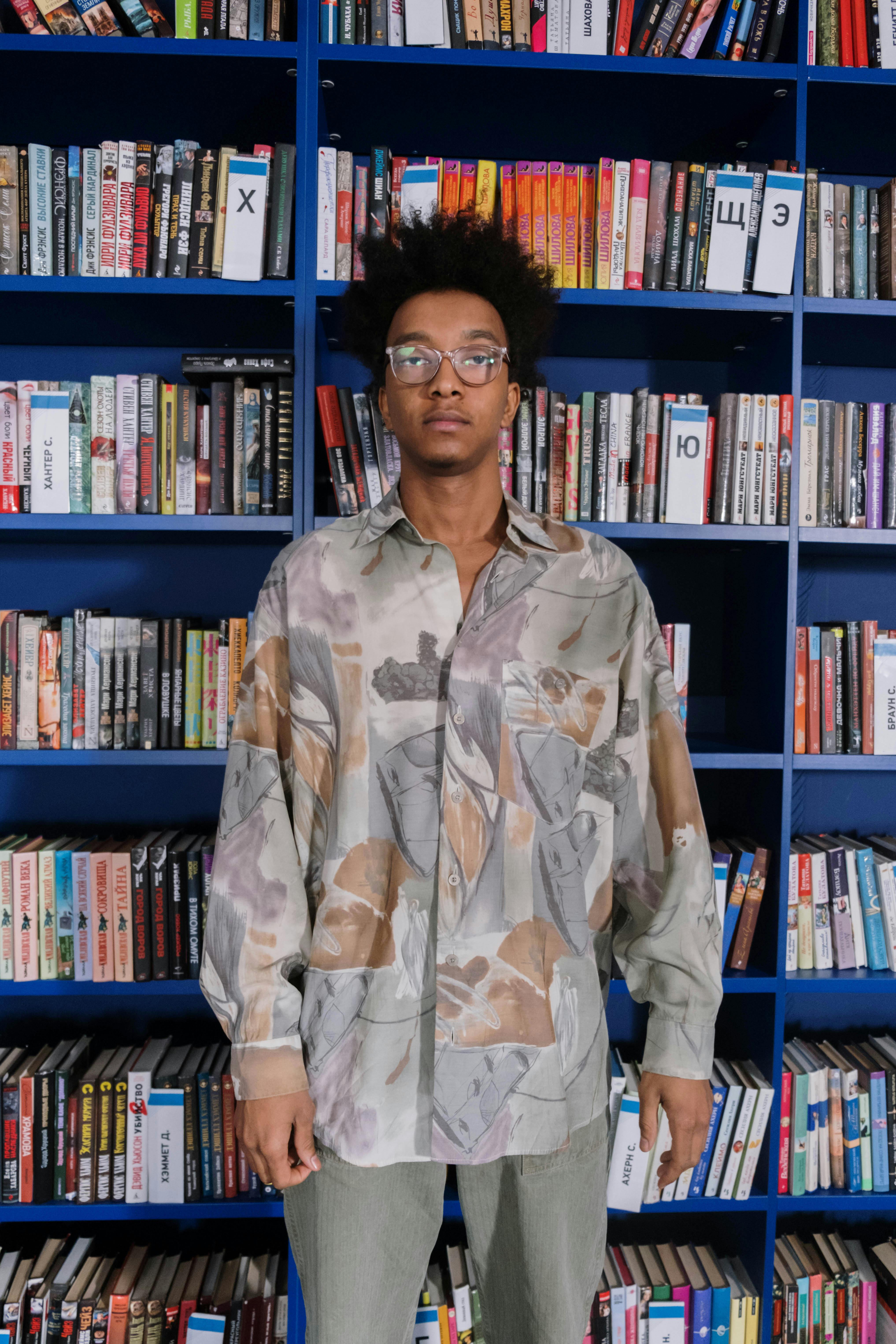 Woman Peaking Through Books · Free Stock Photo