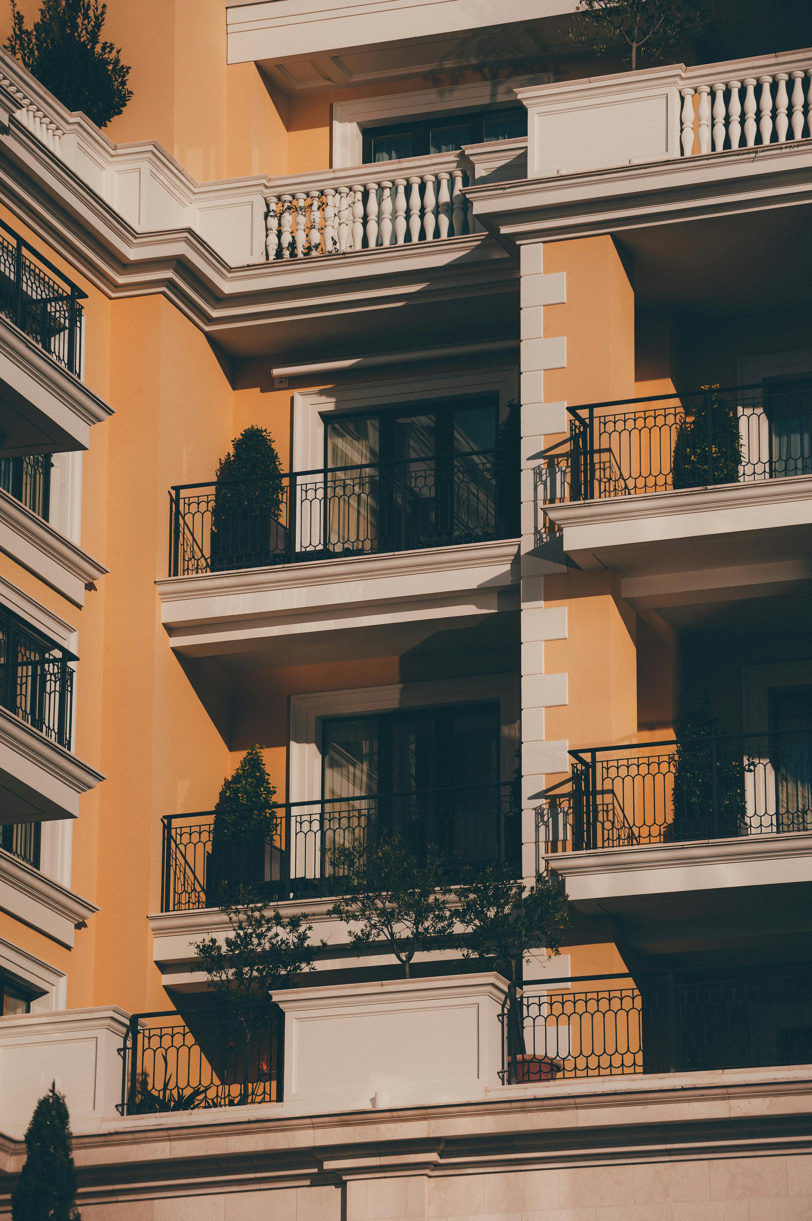 Balconies of a Concrete Building · Free Stock Photo