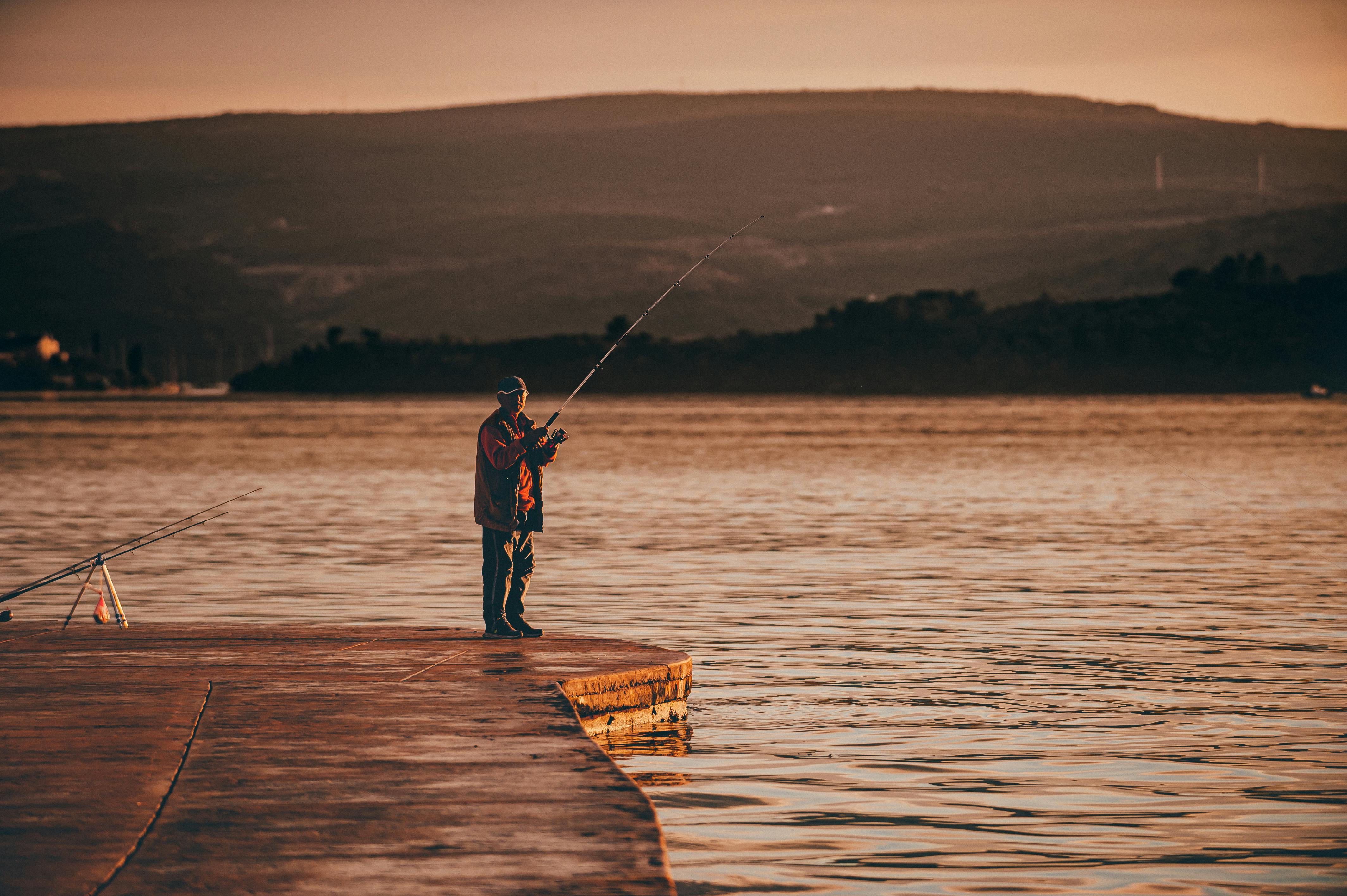 A Person Fishing on the Sea · Free Stock Photo