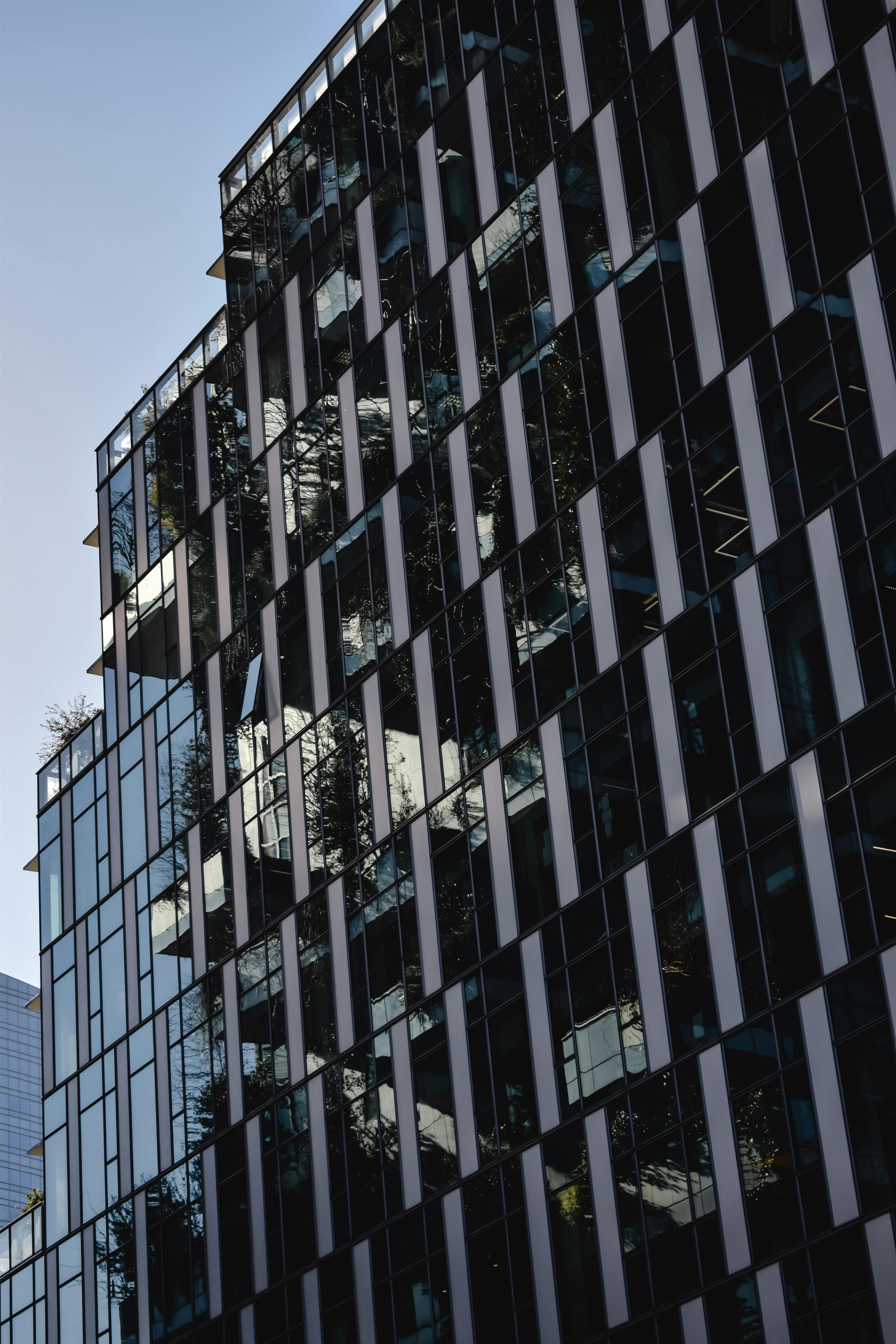 A Modern Building with Glass Windows · Free Stock Photo