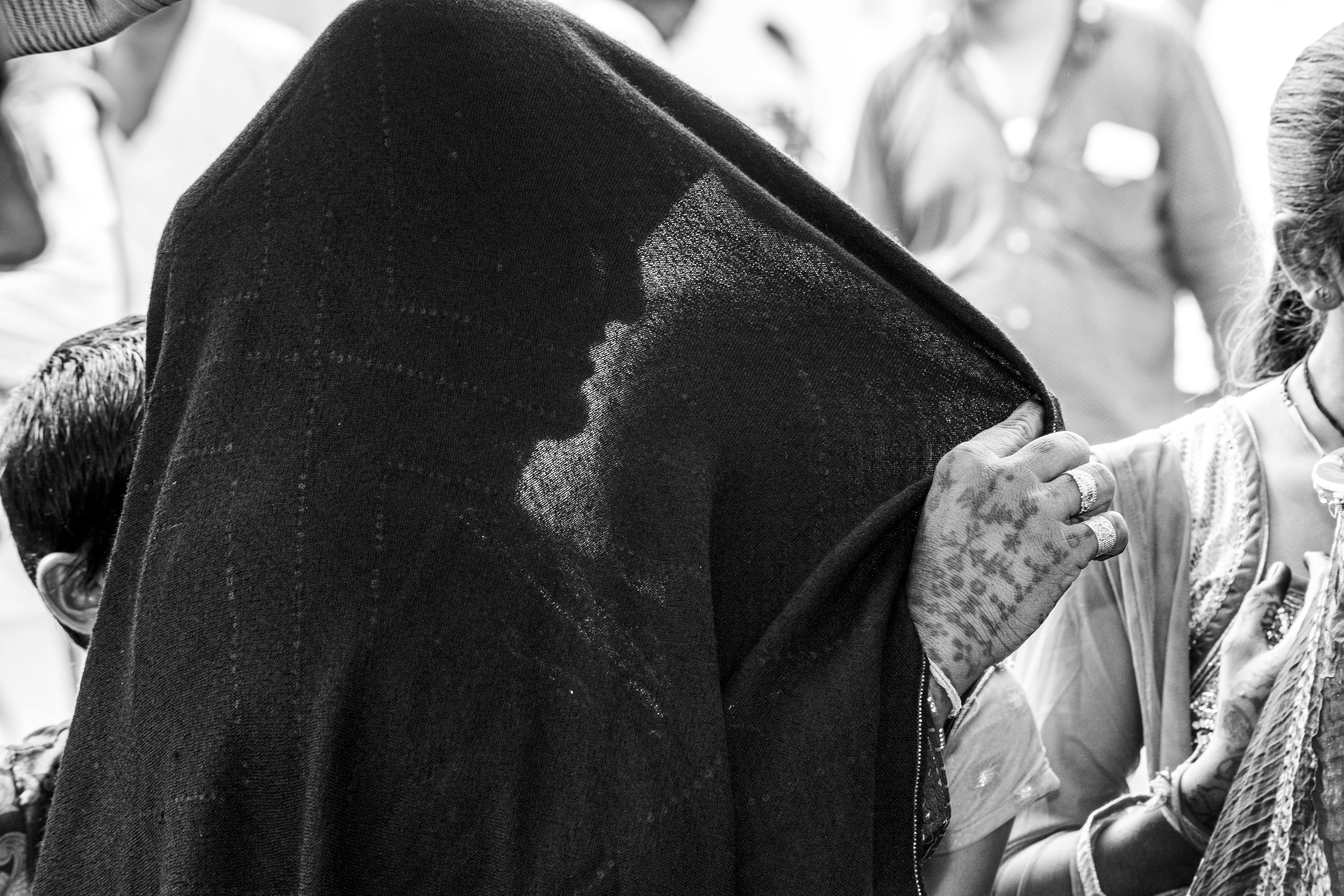 A Person Covered with Black Blanket · Free Stock Photo