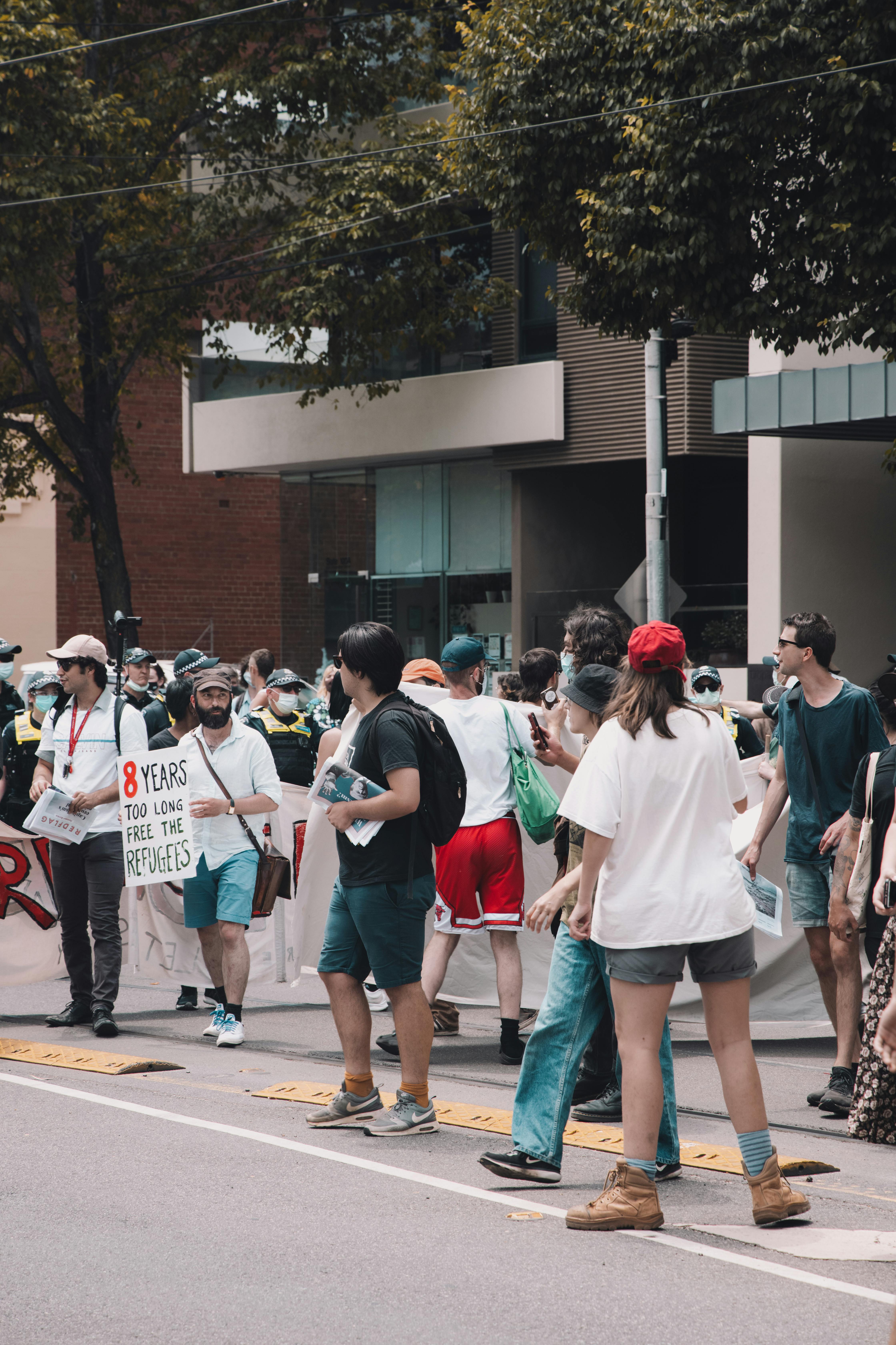 Protesters Holding Posters during their Rally · Free Stock Photo