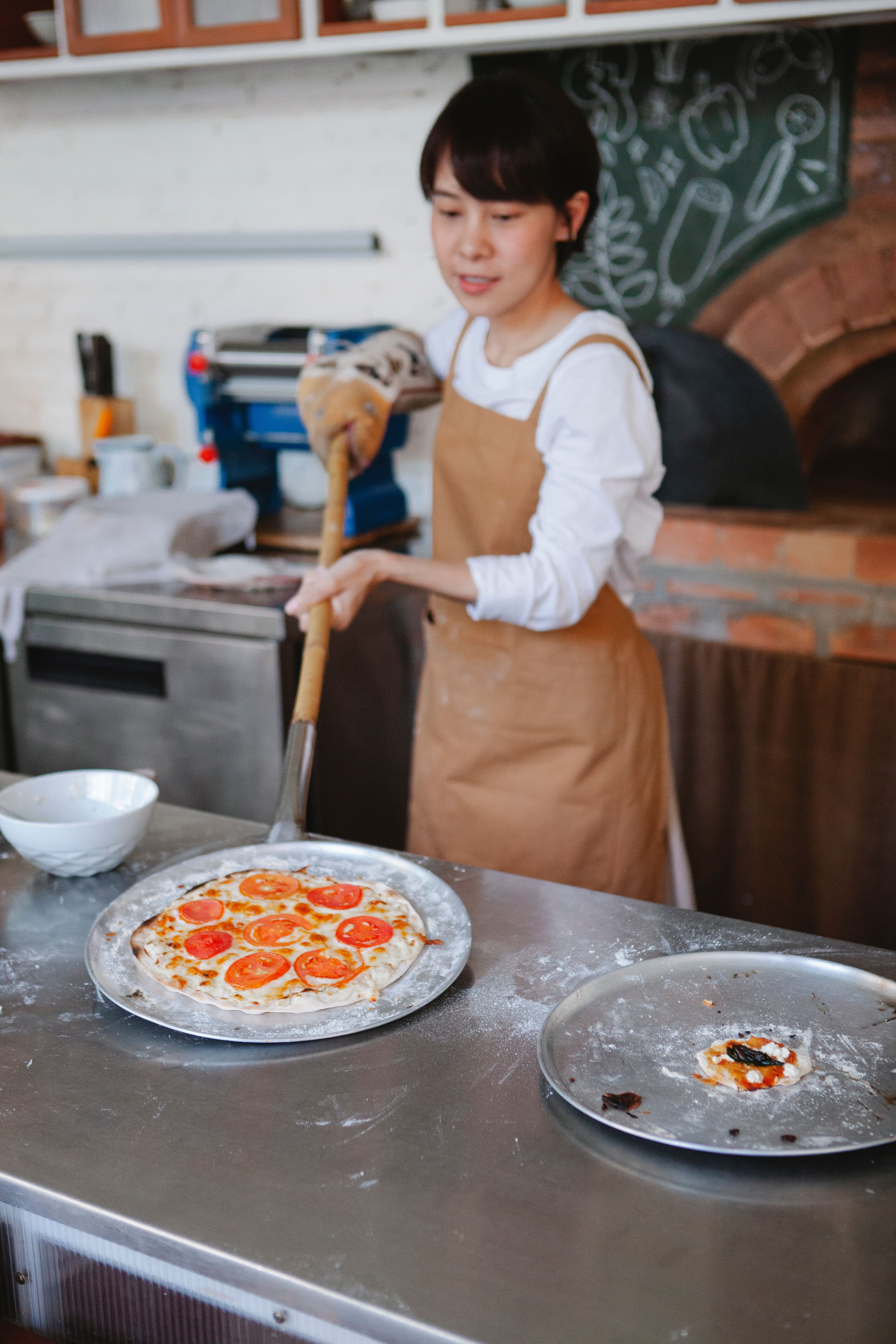 Photo Of Person Making A Pizza · Free Stock Photo