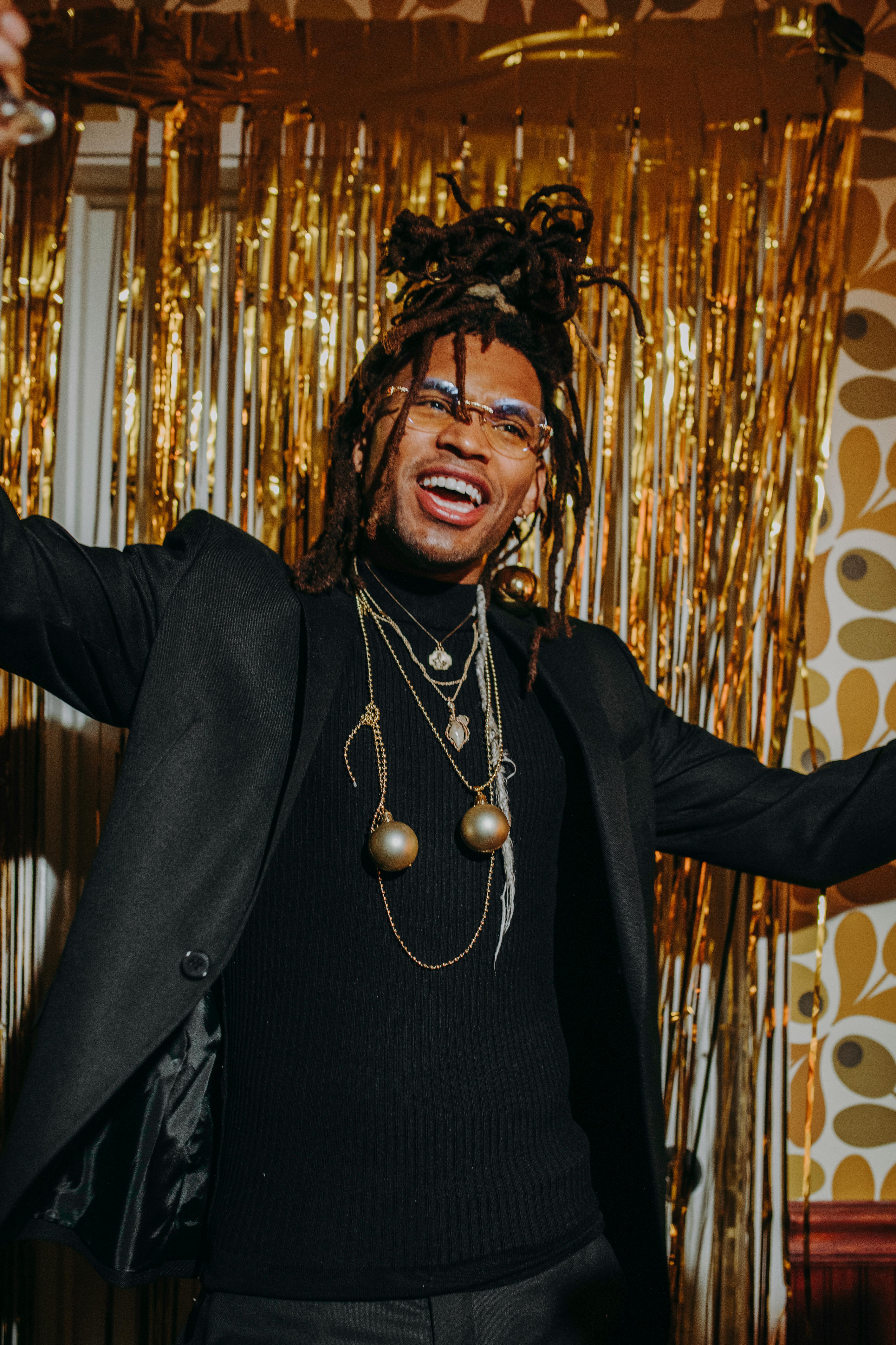 Photo of a Man with Dreadlocks Dancing · Free Stock Photo