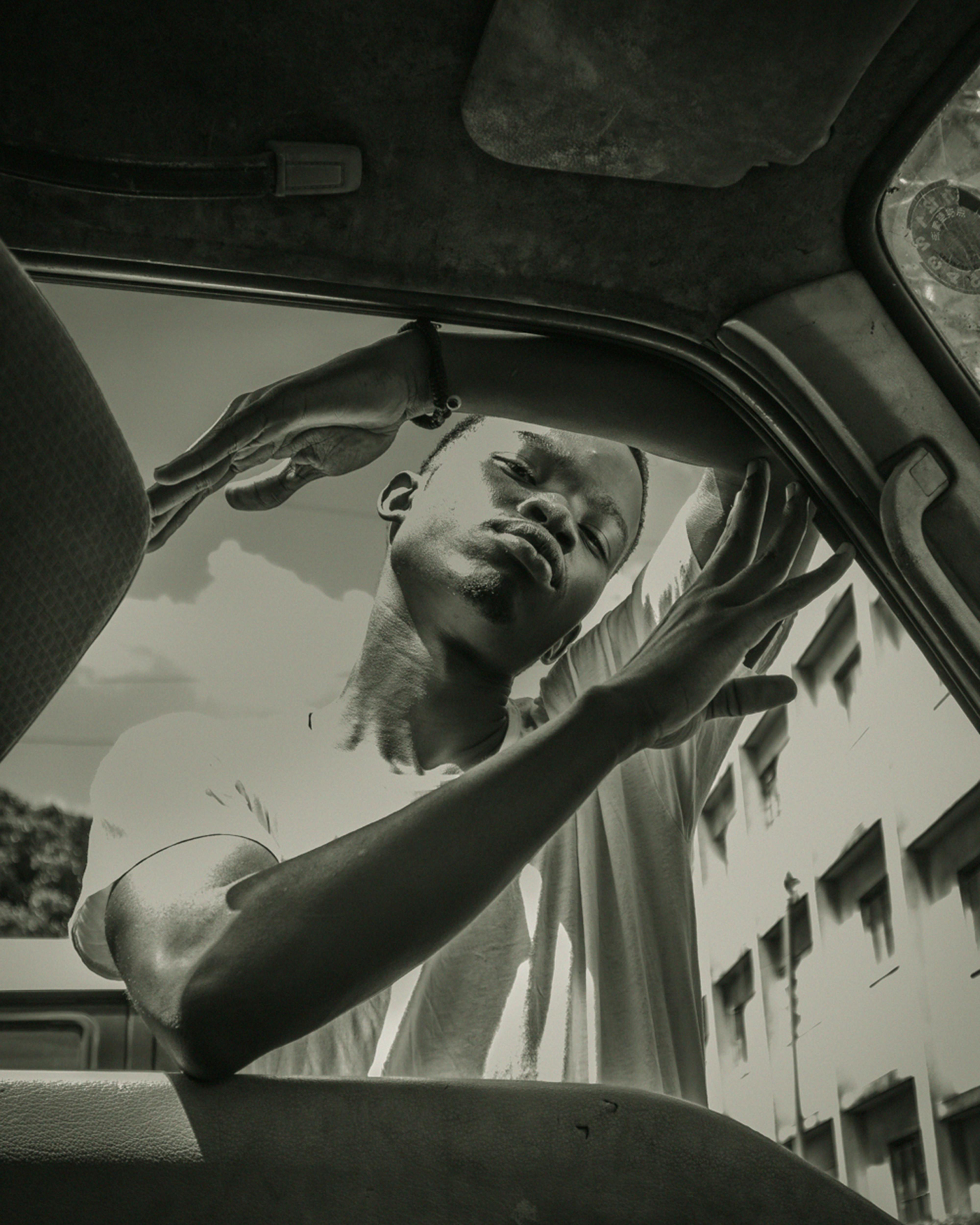 Woman Posing on Car Hood · Free Stock Photo