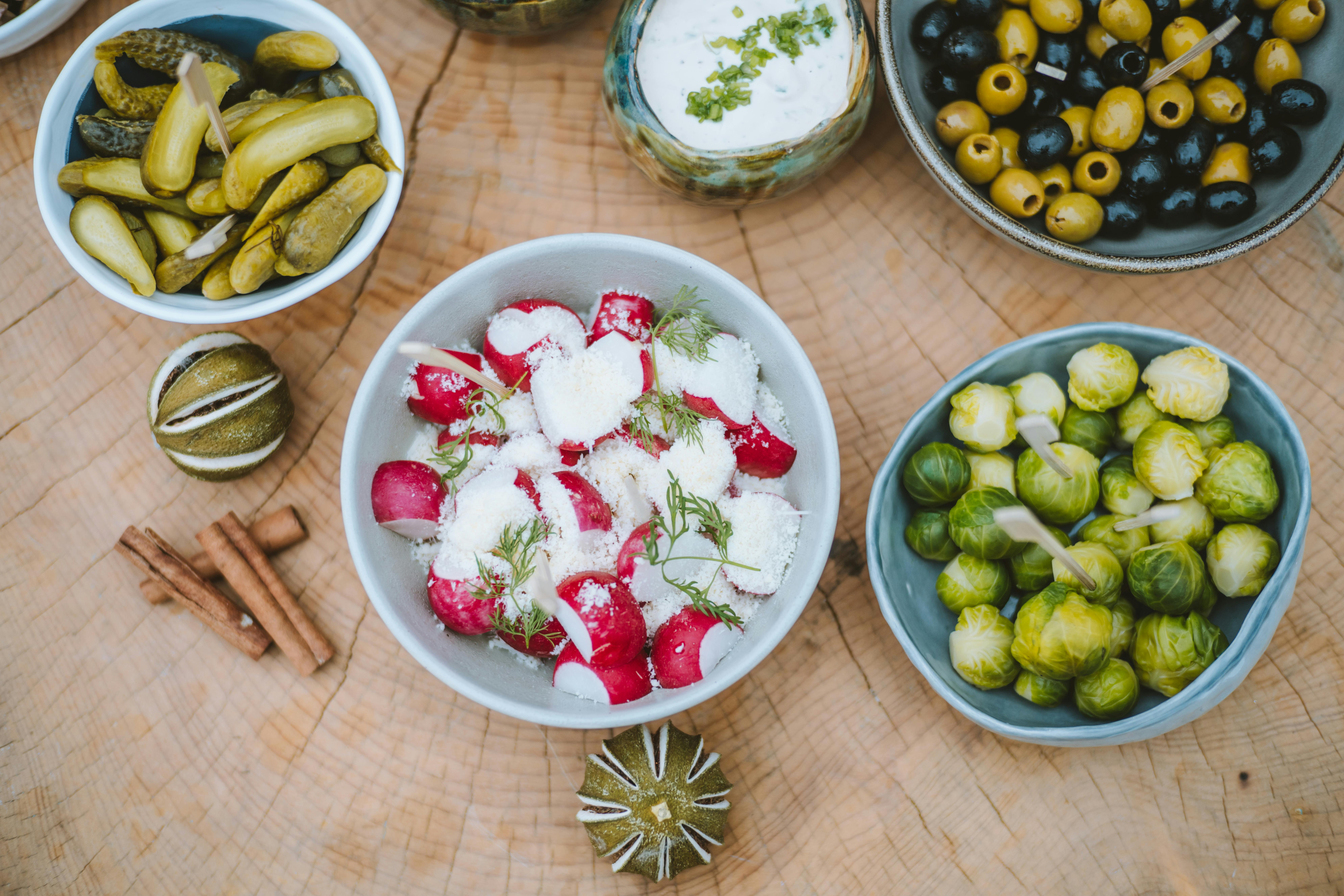 Bowls Vegetables Dish over a Tree Stump · Free Stock Photo