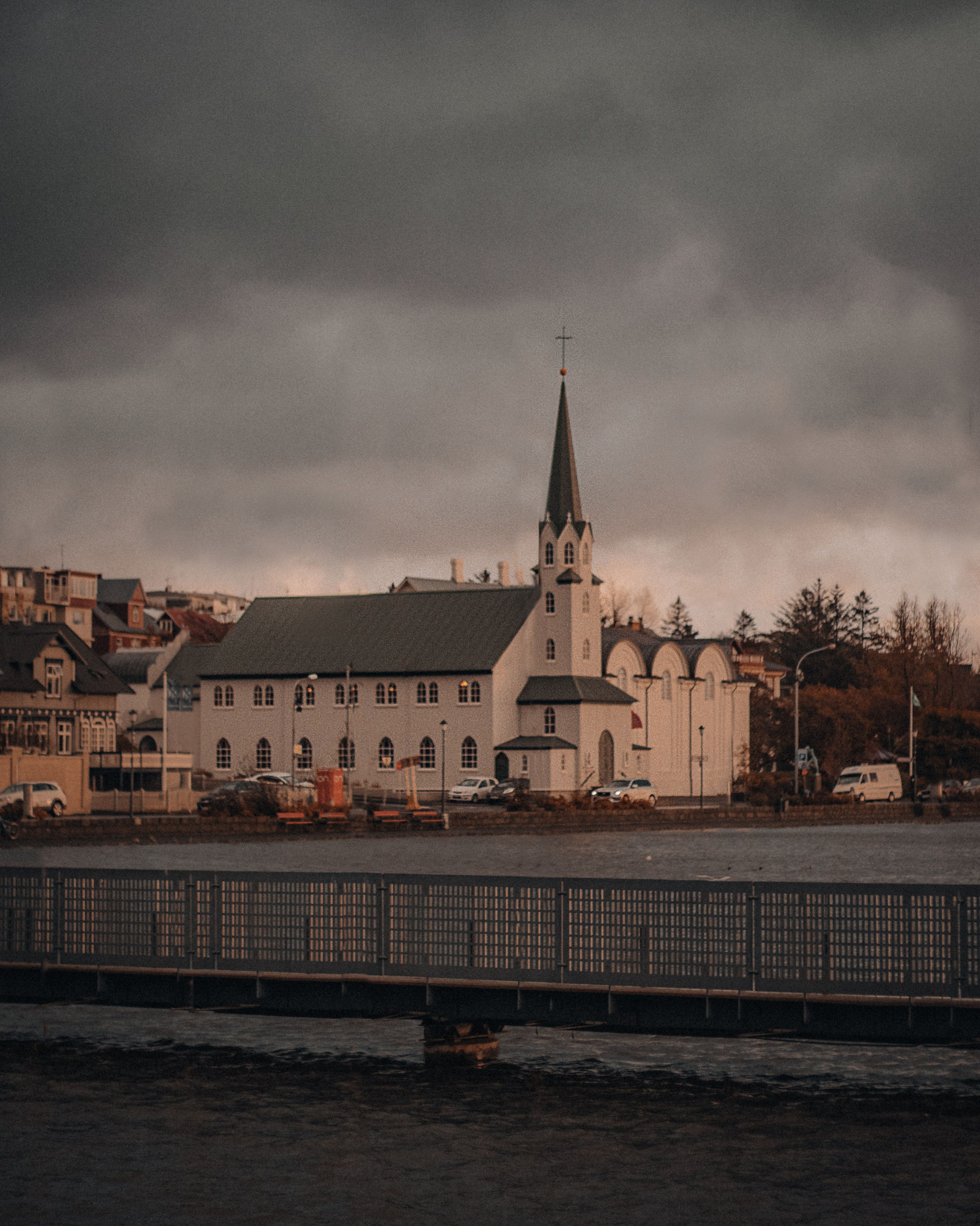Gray Building Under Clouds · Free Stock Photo