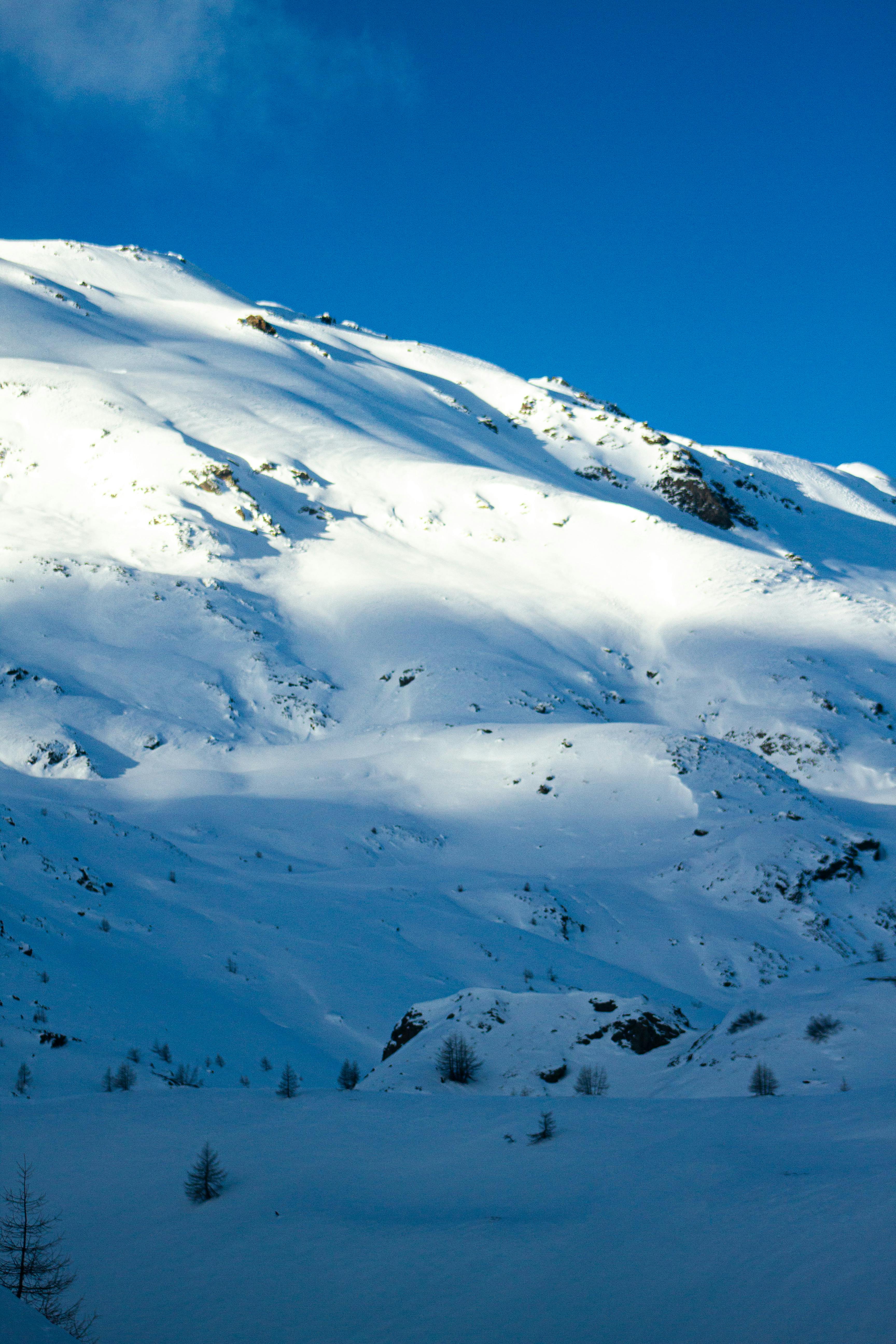 Full Moon Over Snow Covered Mountain · Free Stock Photo