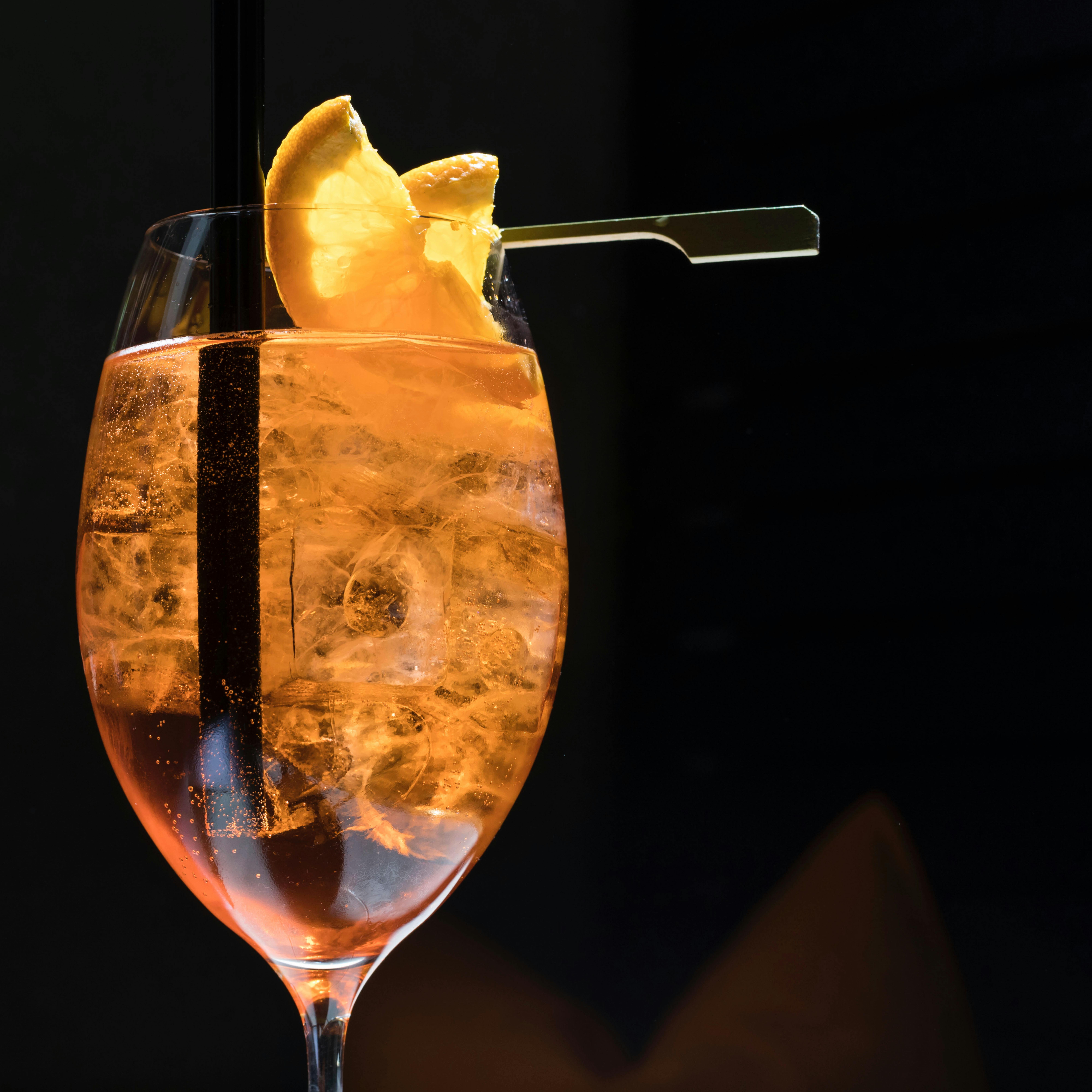 Glass of refreshing cold cocktail on table · Free Stock Photo