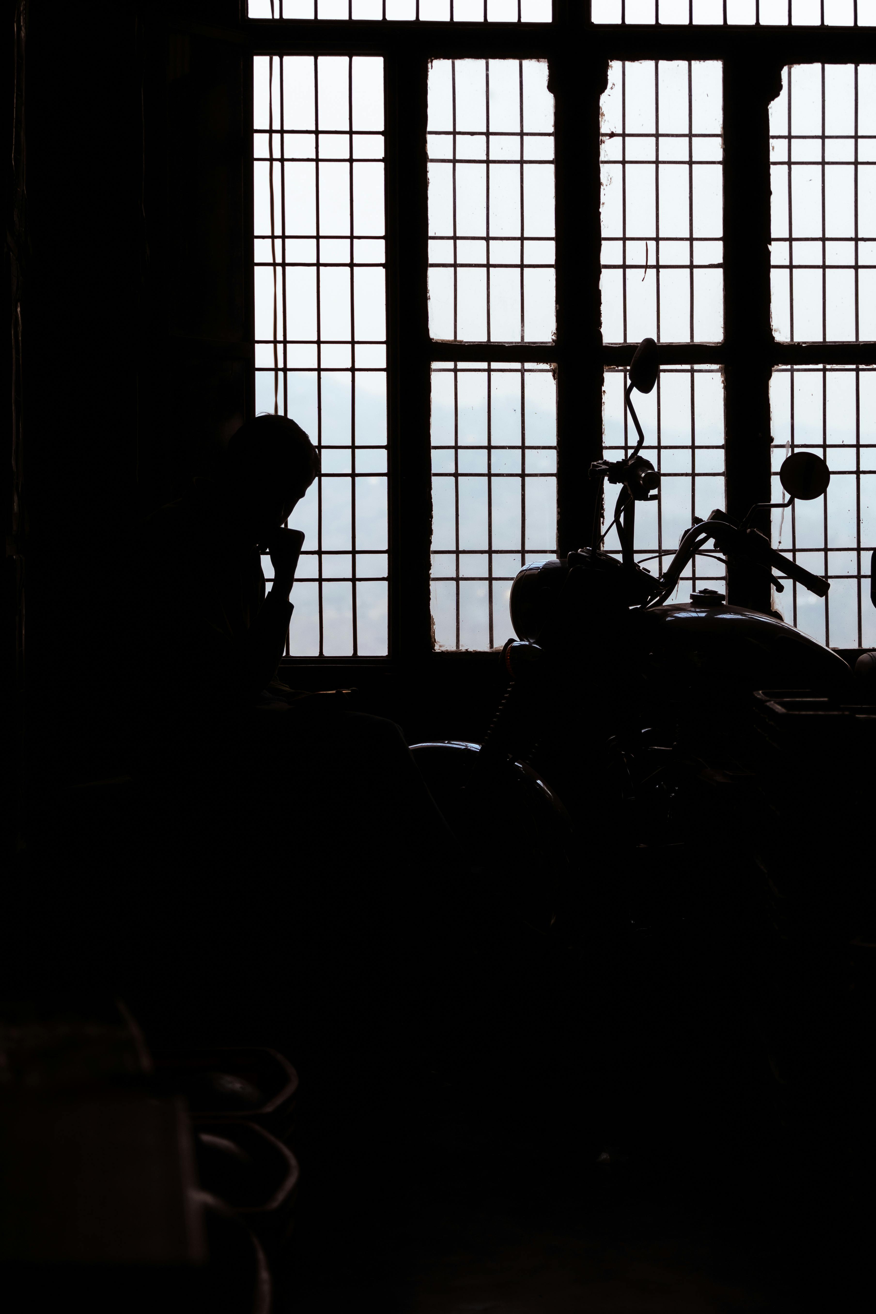 Girl Sitting By The Window · Free Stock Photo