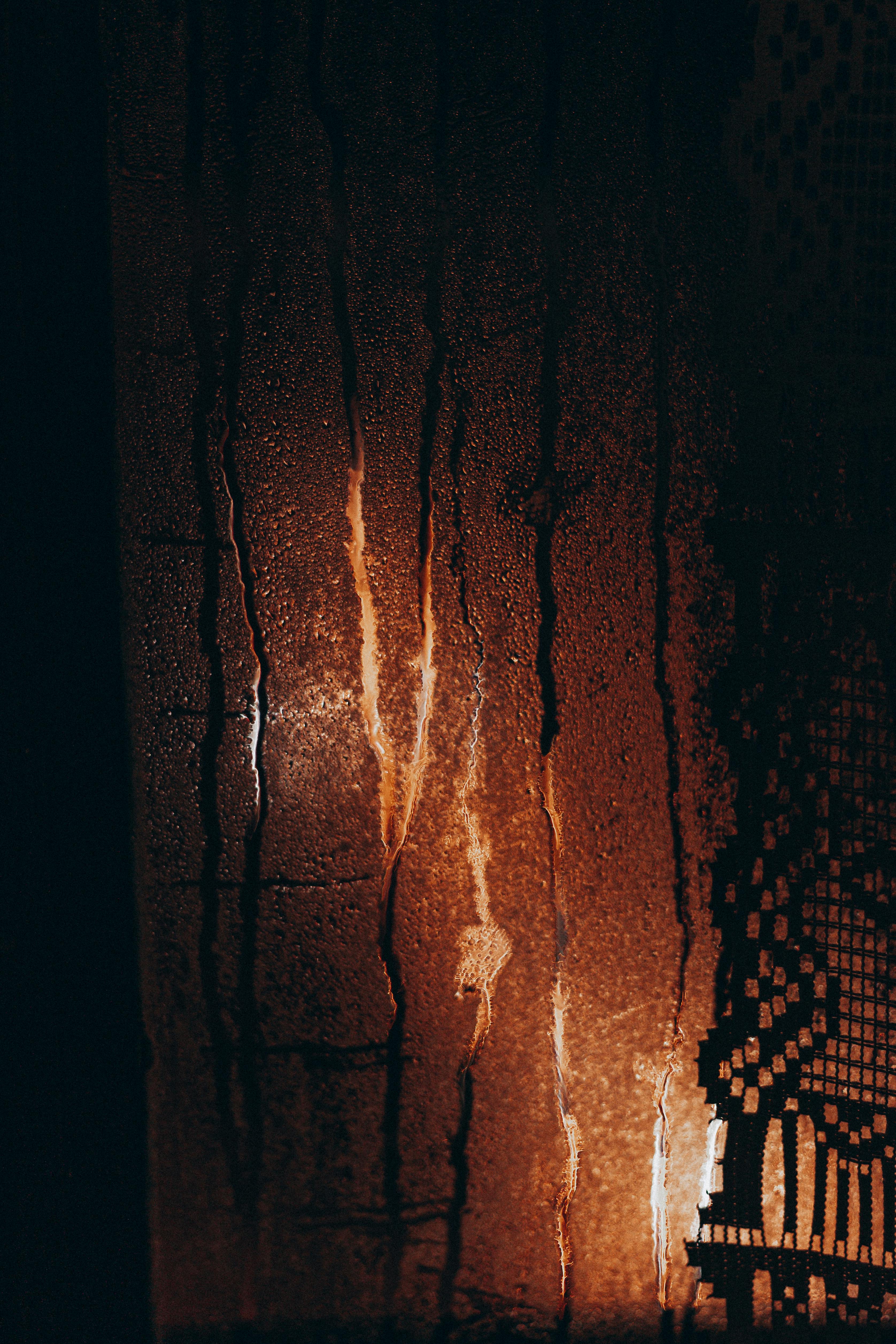 Bright lights behind steamy window at night · Free Stock Photo