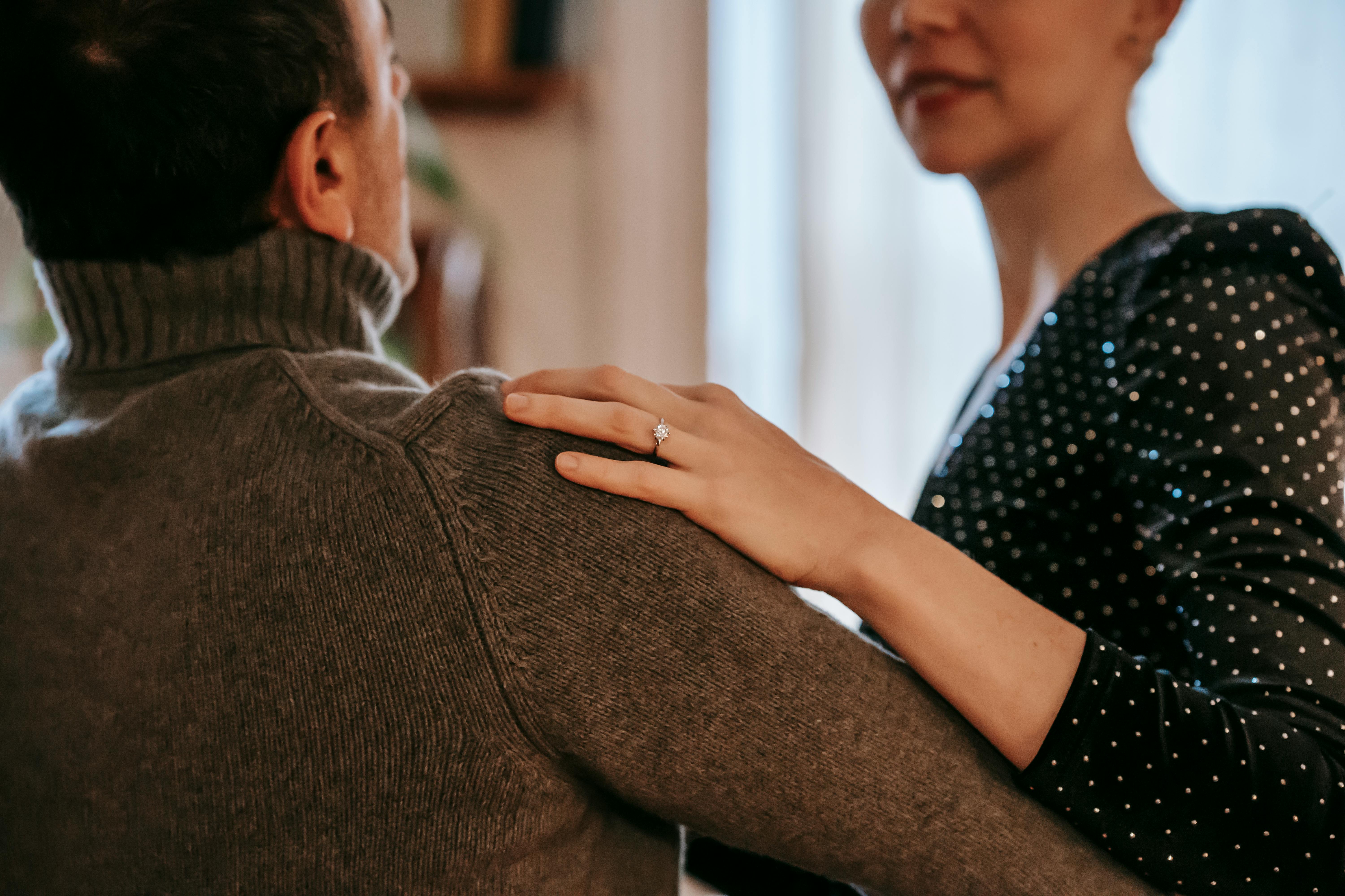Crop unrecognizable couple cuddling together in dance · Free Stock Photo