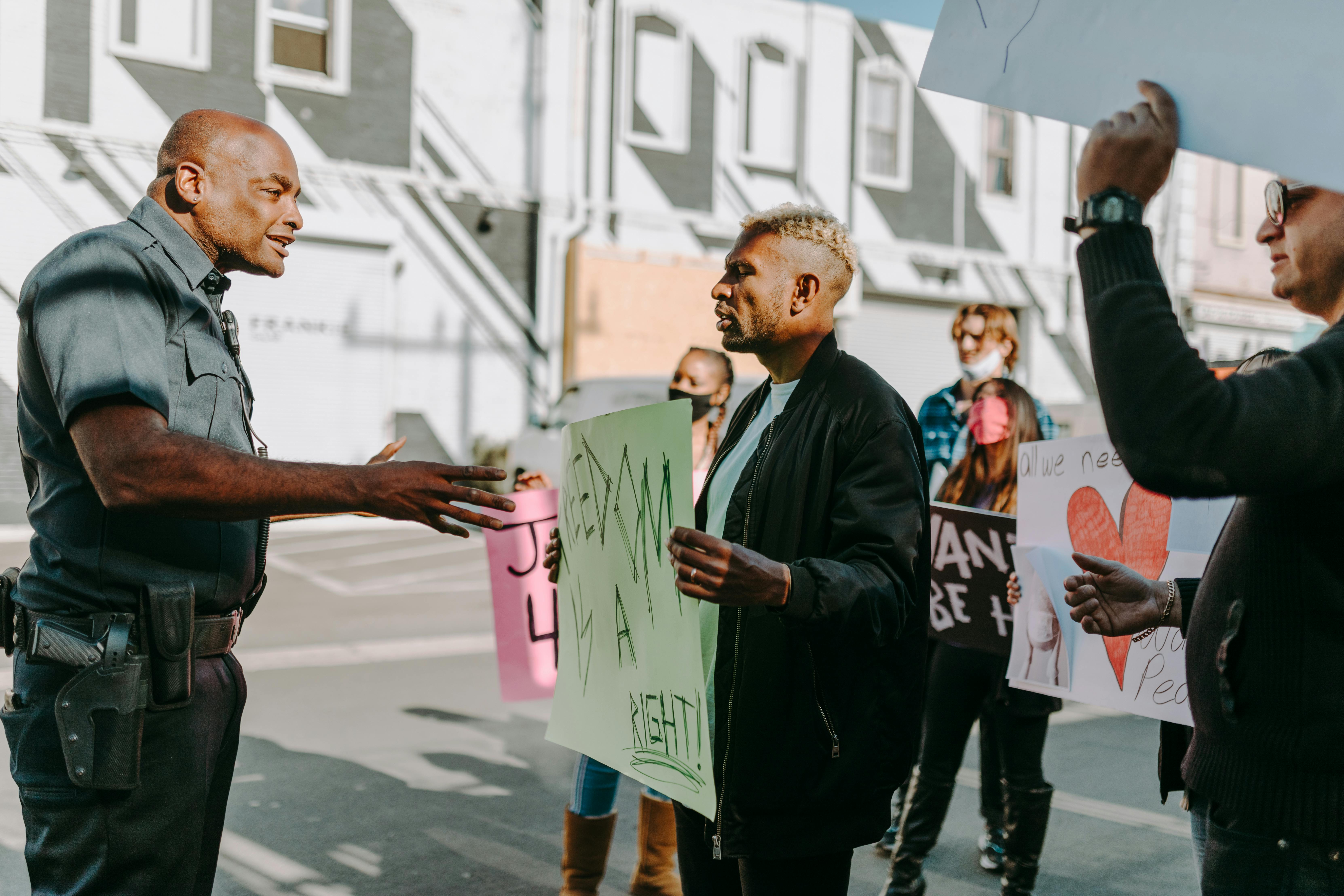 Rallyists Standing on the Street while Having a Peaceful Protest · Free ...