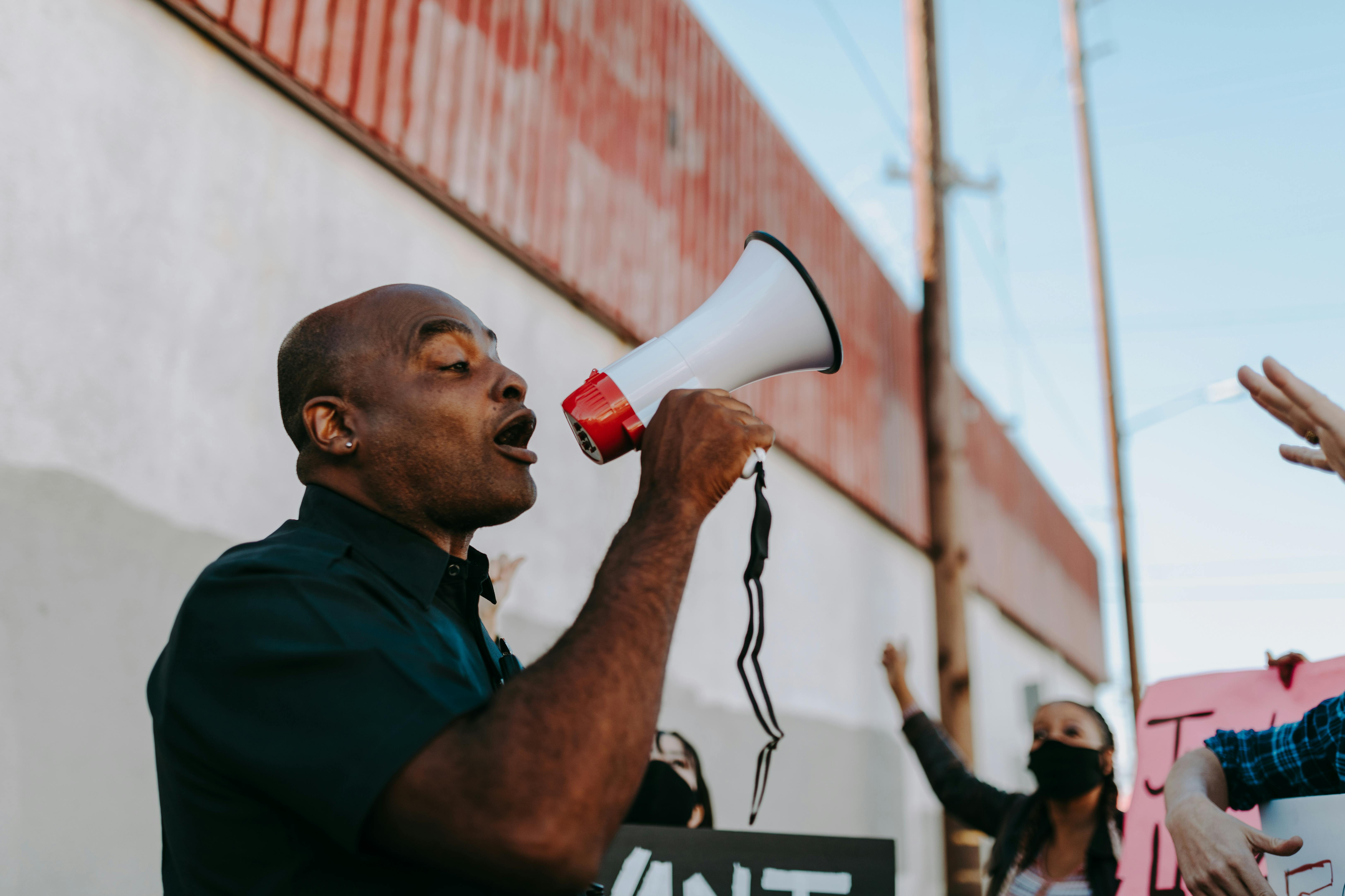 A Man Using Megaphone · Free Stock Photo