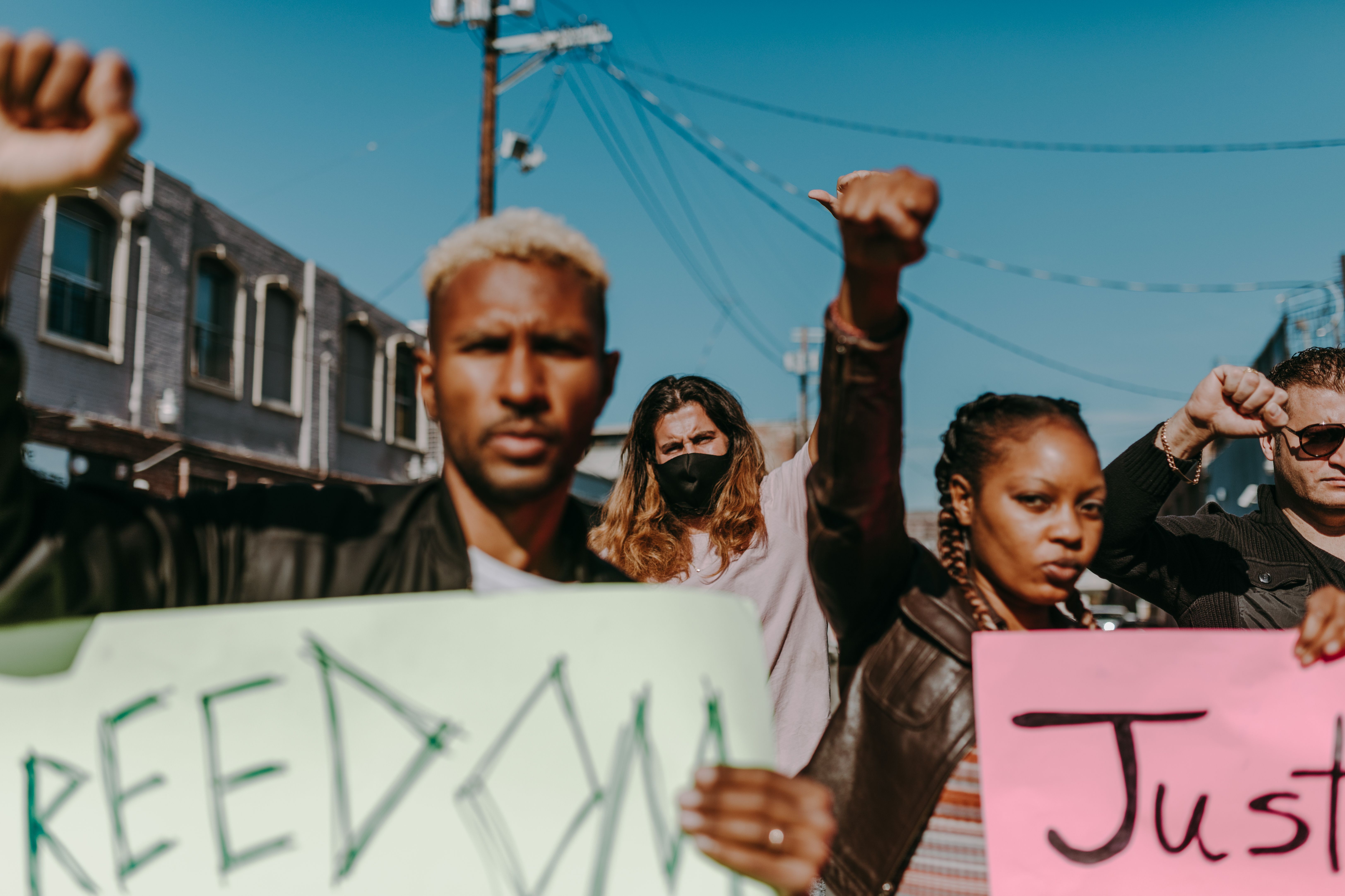 People Carrying a Banner · Free Stock Photo