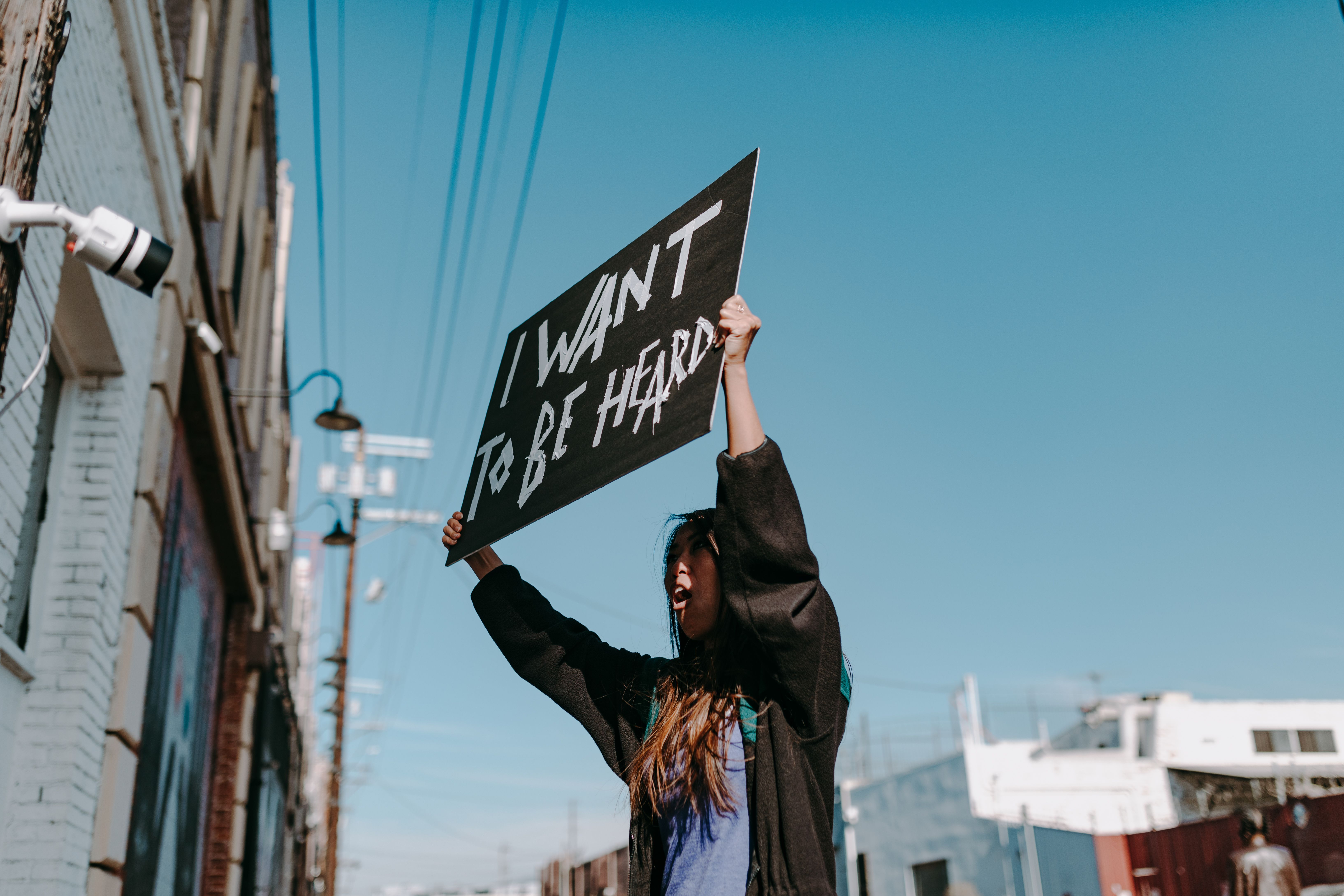 People Carrying a Banner · Free Stock Photo