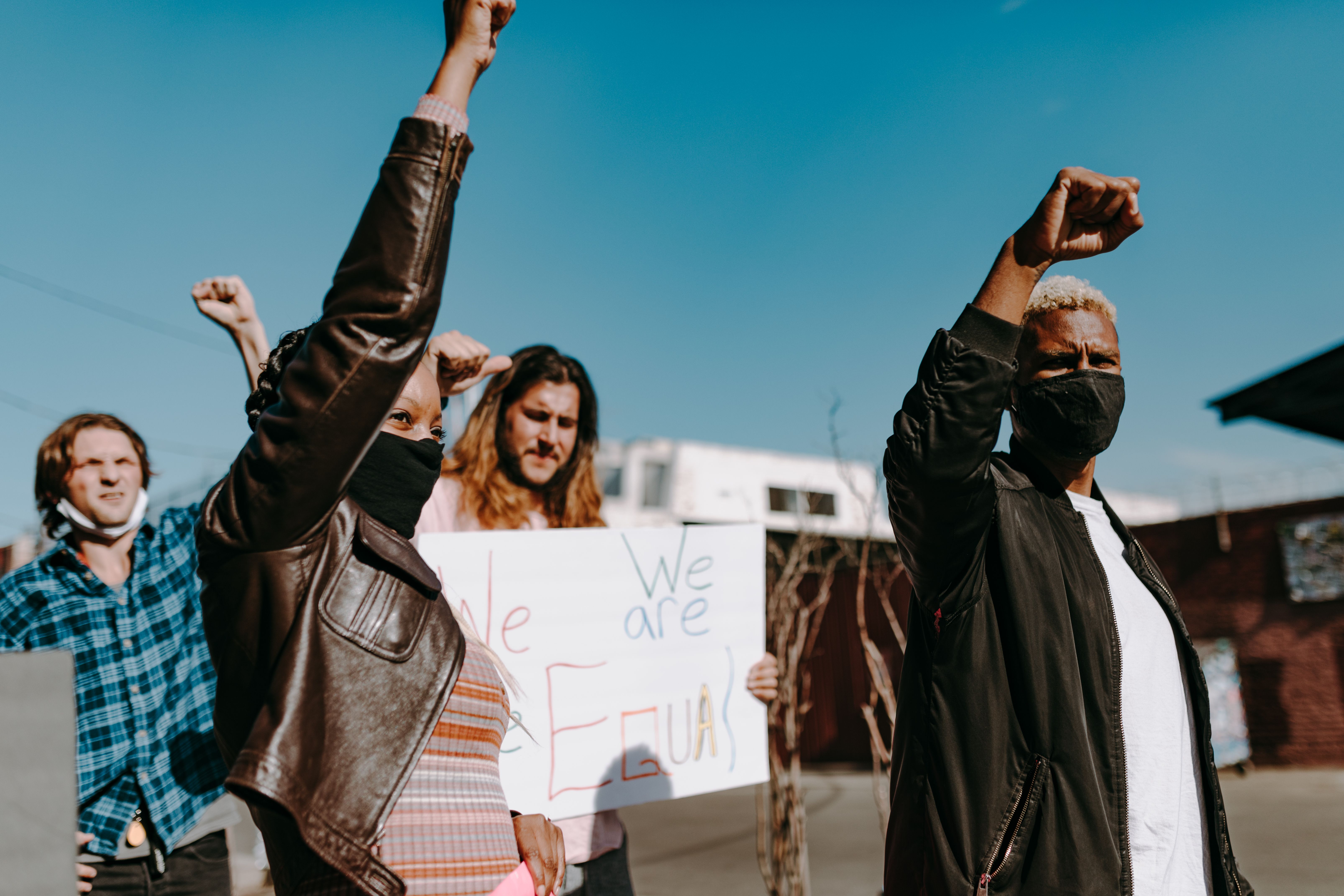 People Holding Protest Banners · Free Stock Photo
