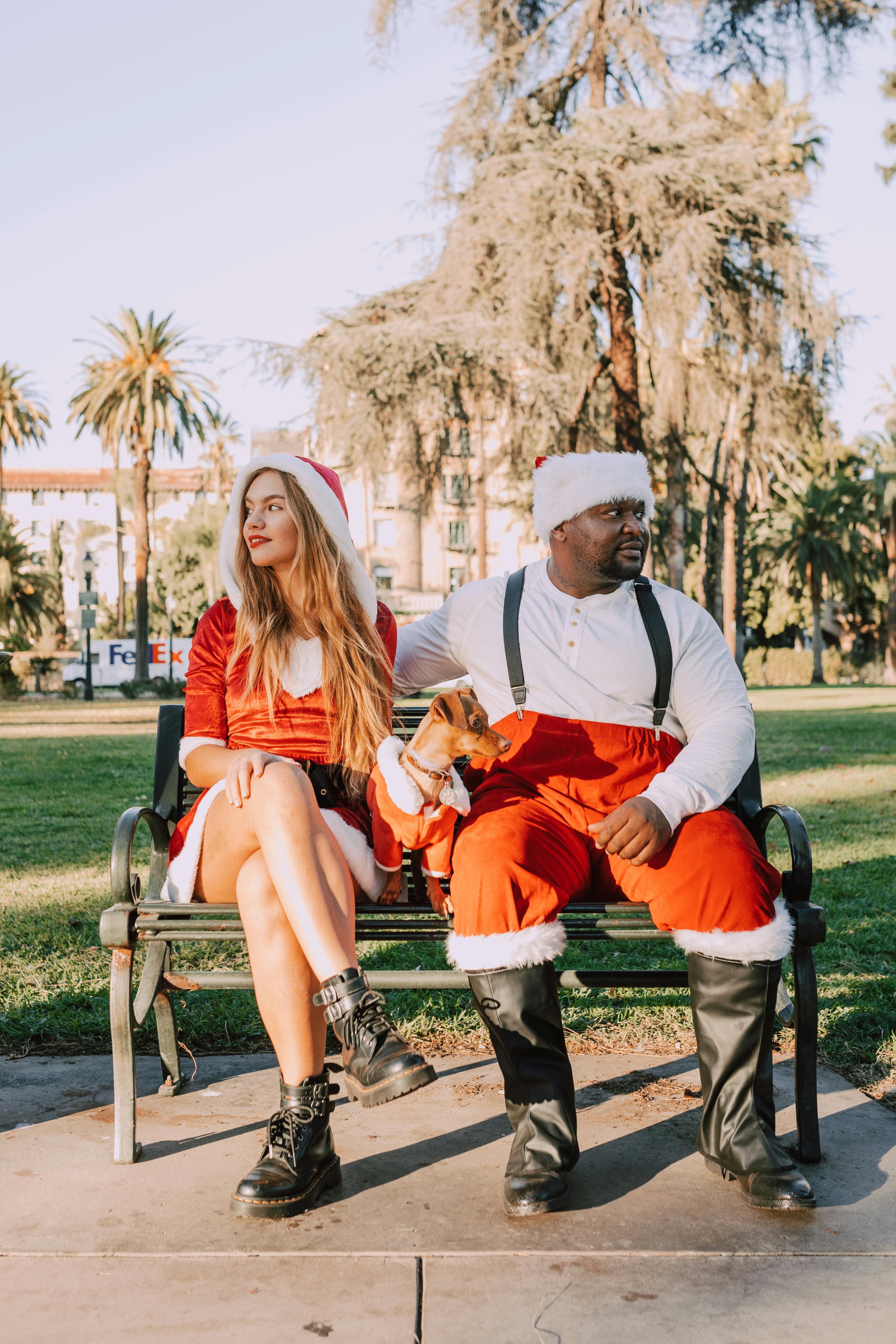 Man In Santa Claus Costume sitting on The door way · Free Stock Photo