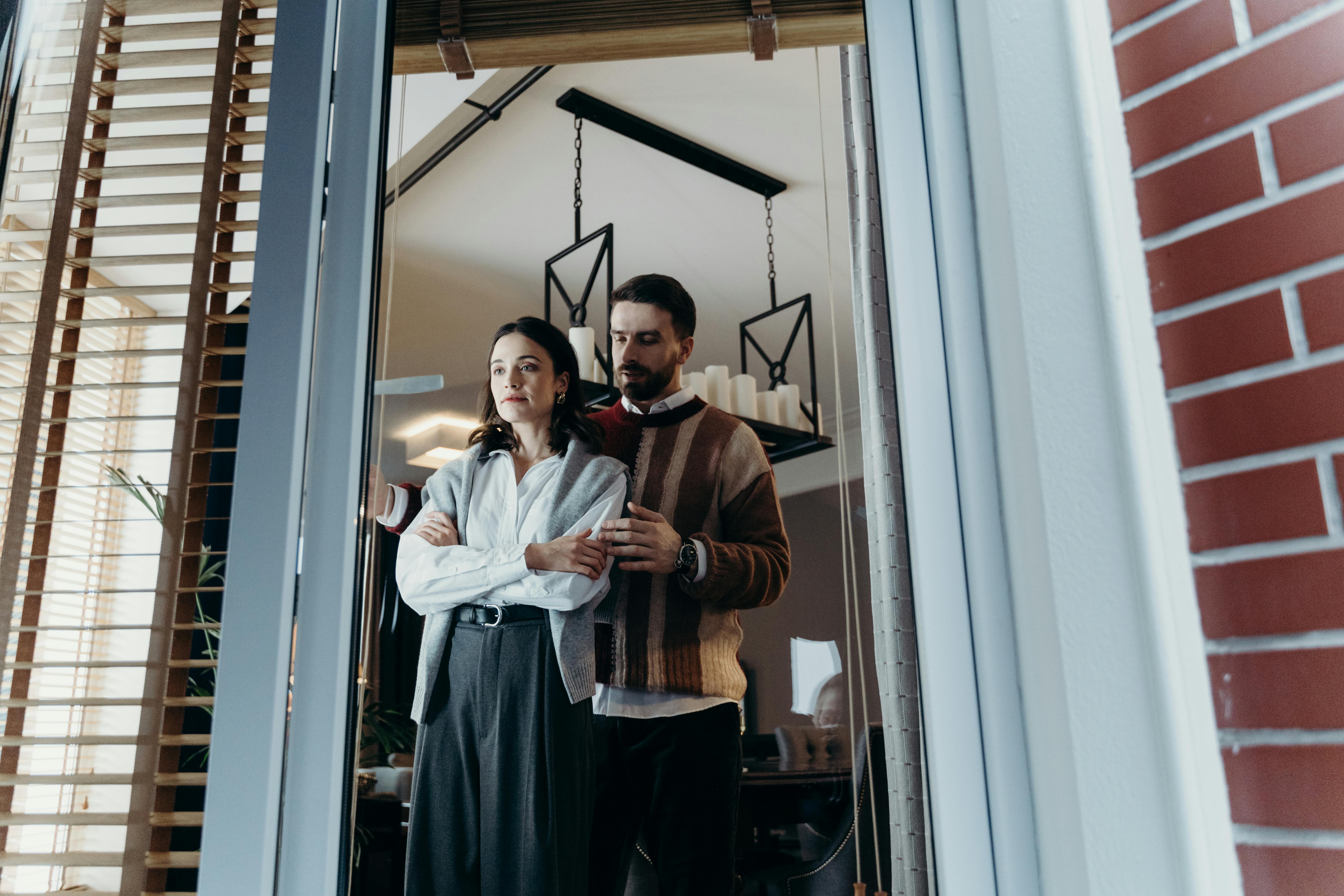 Photo of Two People with their Arms Crossed · Free Stock Photo