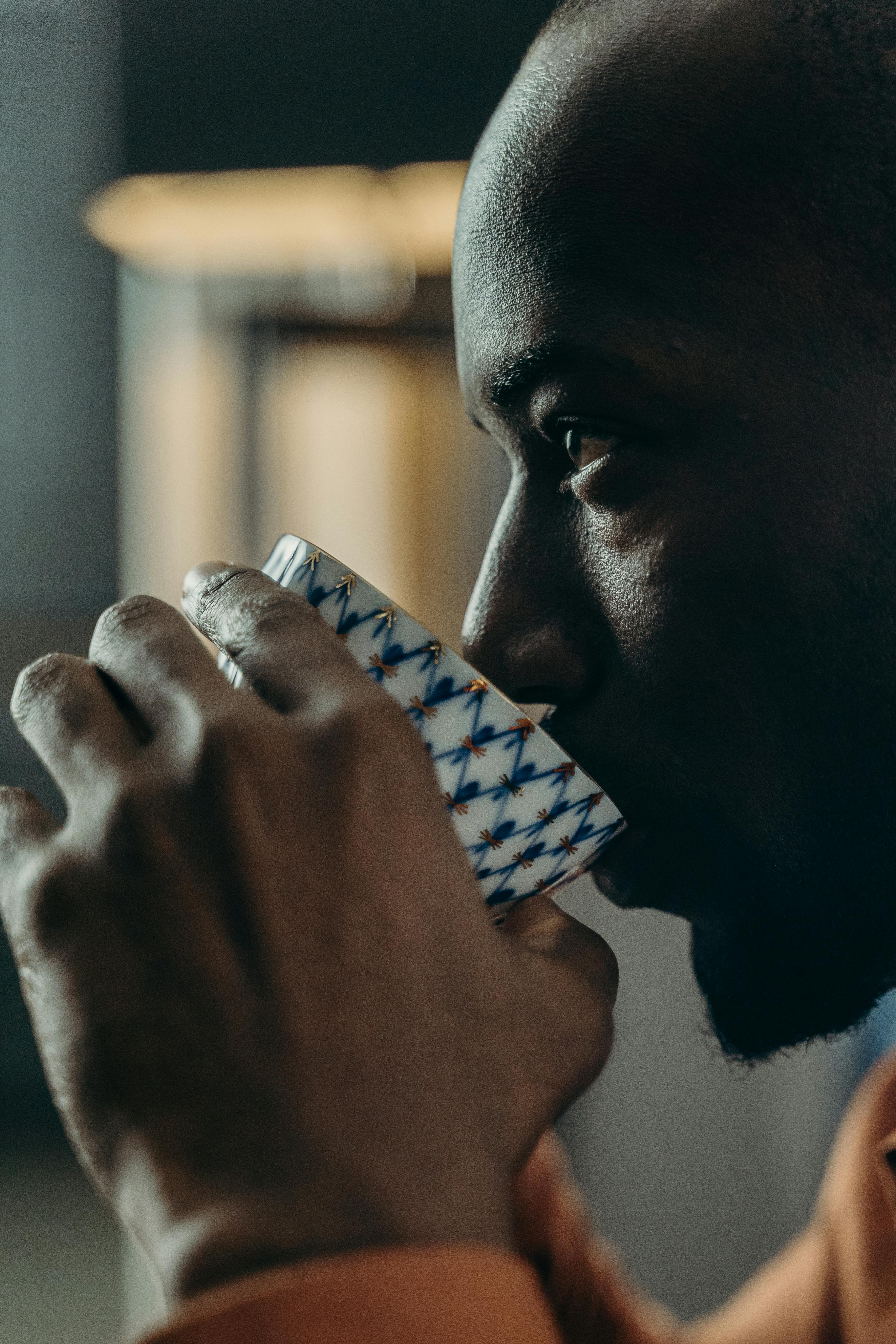 Man Drinking a Cup of Tea · Free Stock Photo