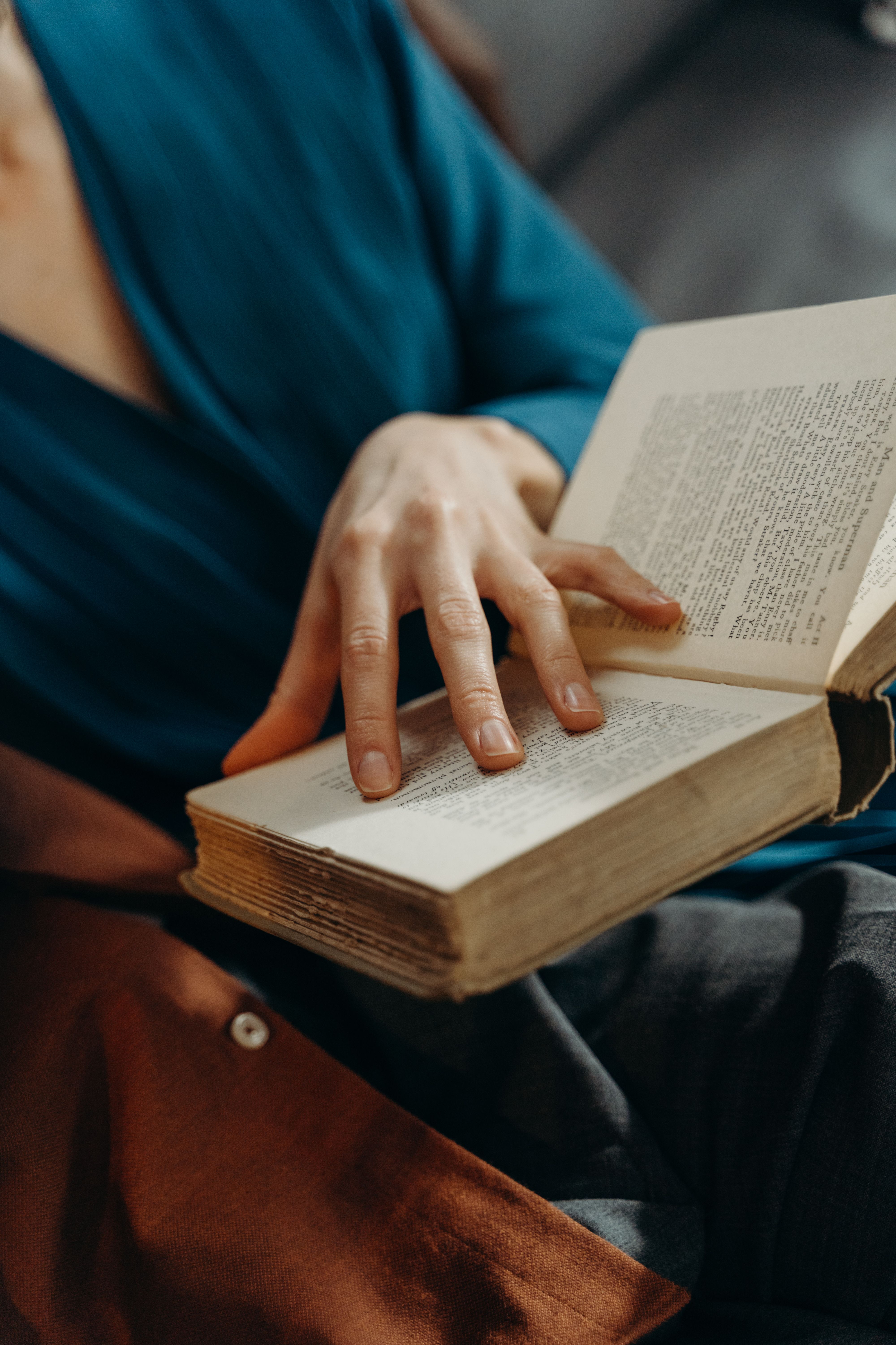 Person Reading a Magazine · Free Stock Photo