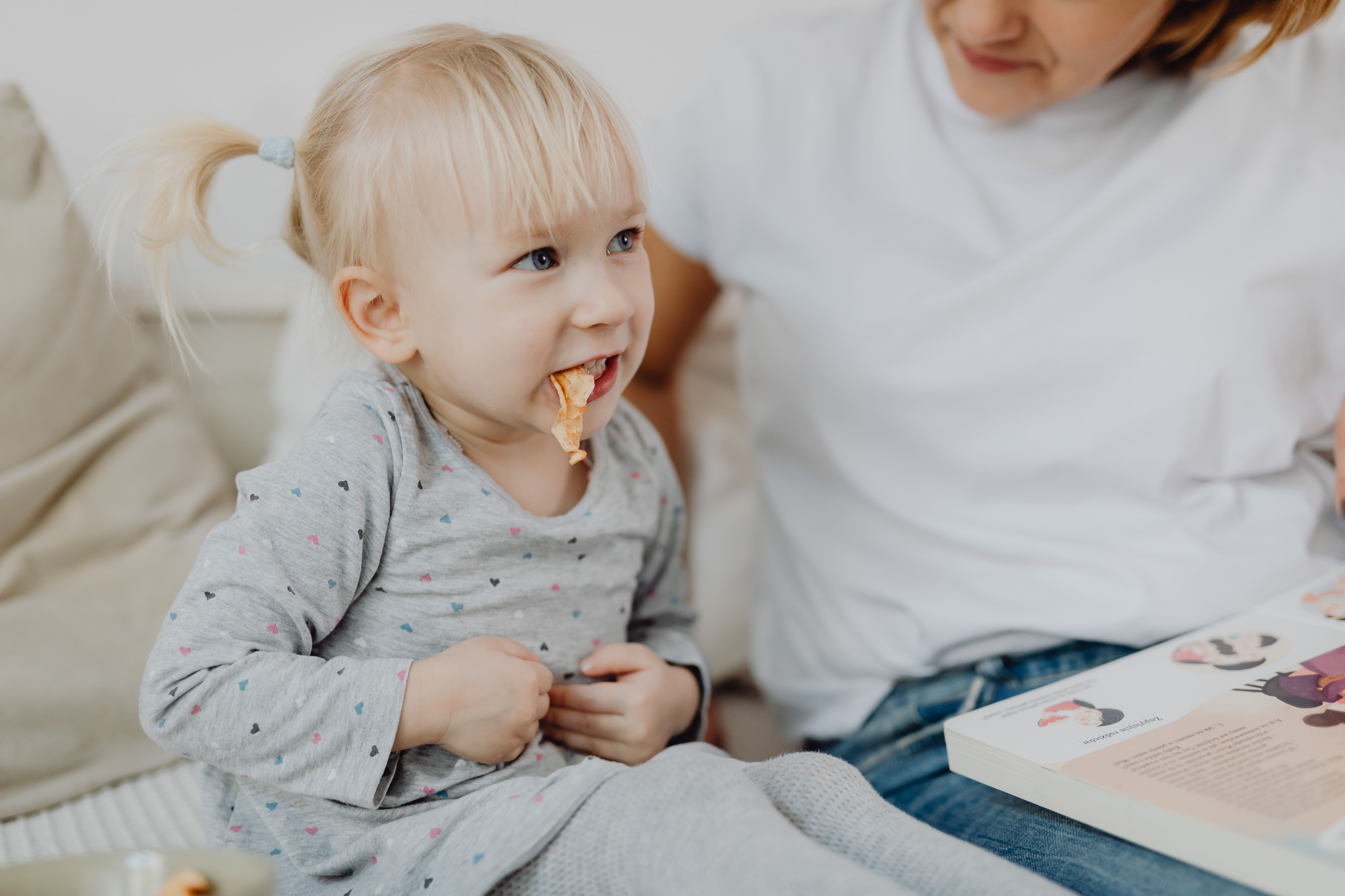 A Cute Little Girl Eating Food · Free Stock Photo