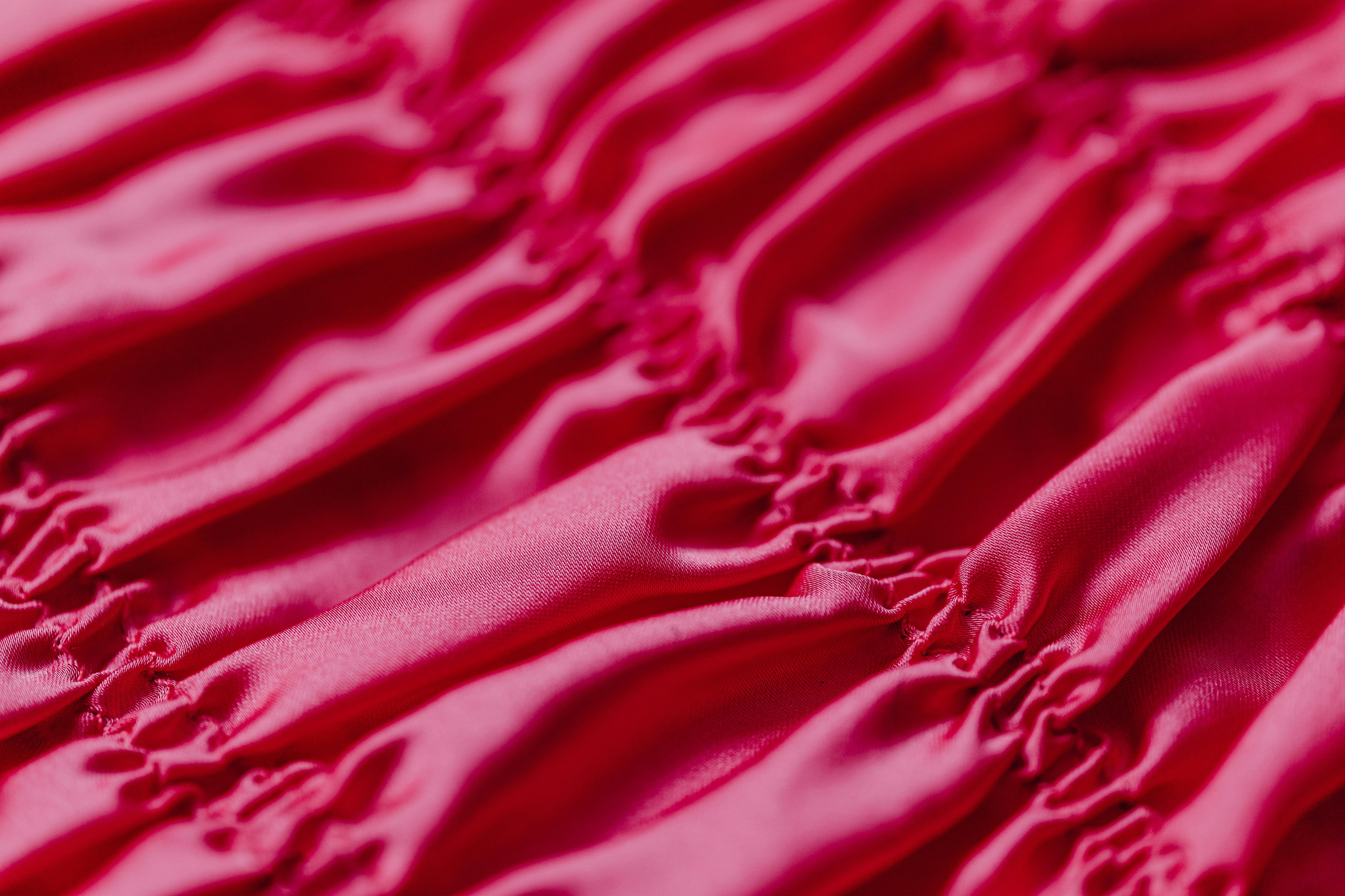 Close-Up Shot of a Magenta Fabric · Free Stock Photo