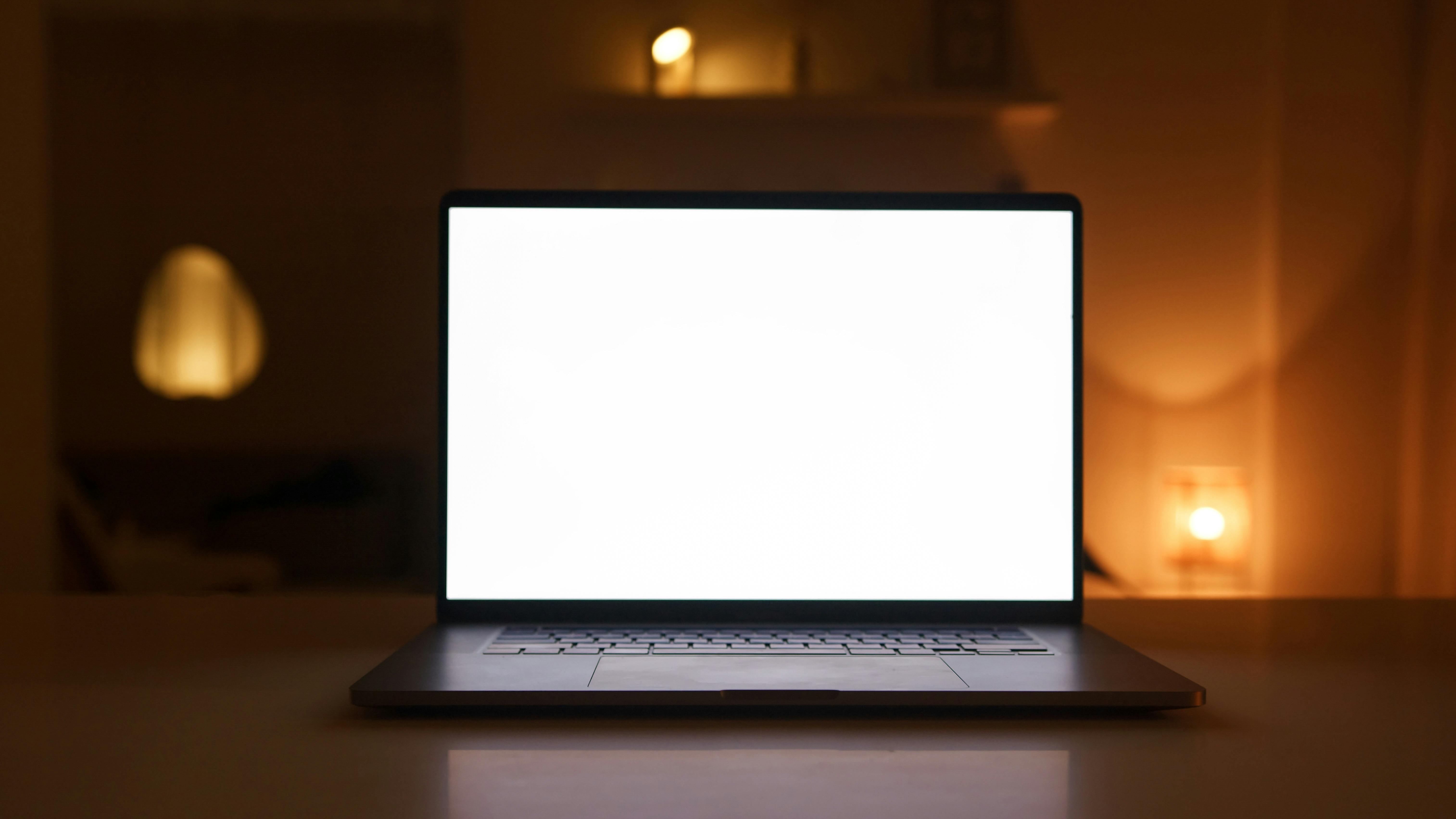 A Laptop With a White Screen · Free Stock Photo