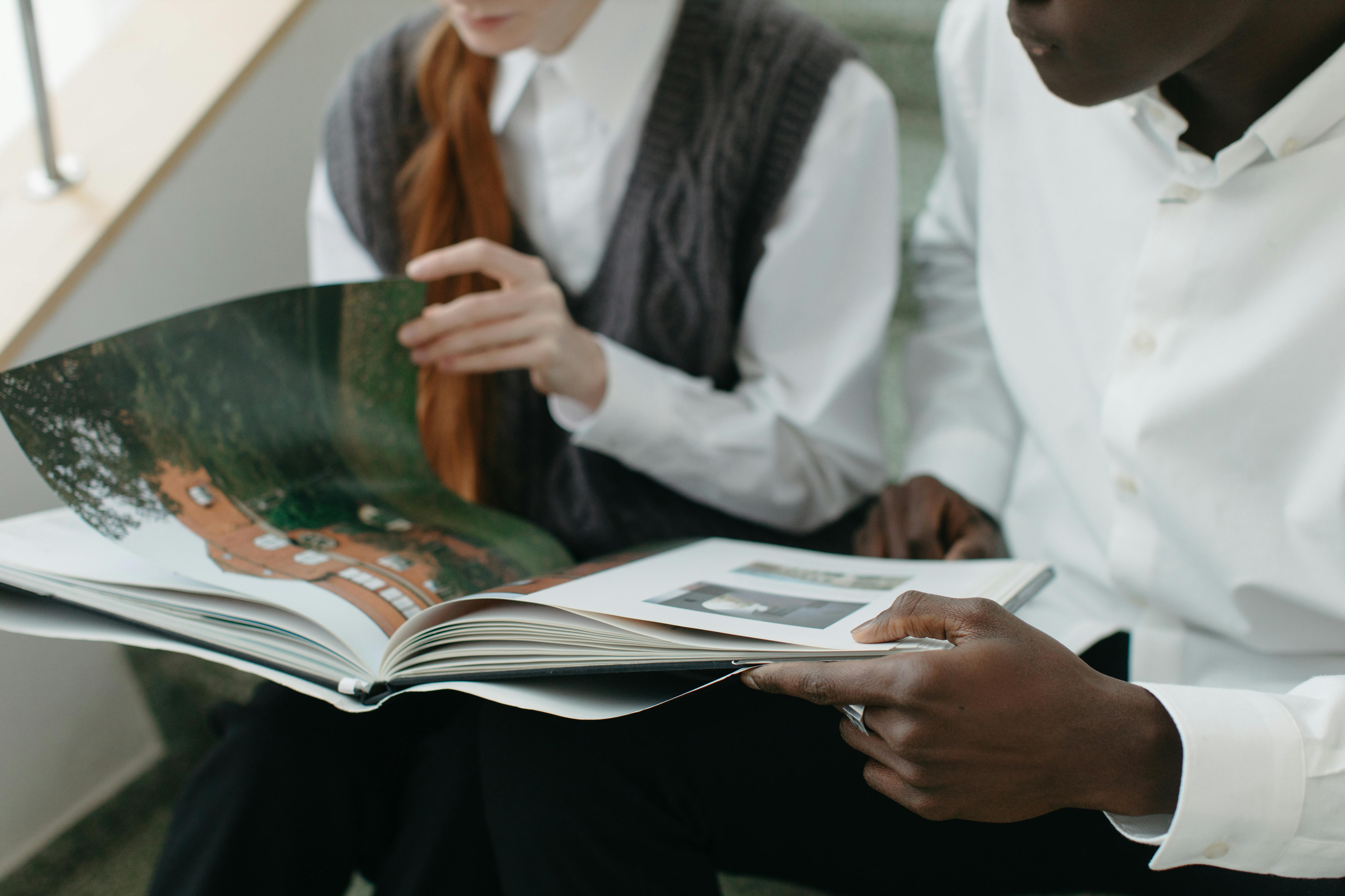 A Person Holding a Book · Free Stock Photo