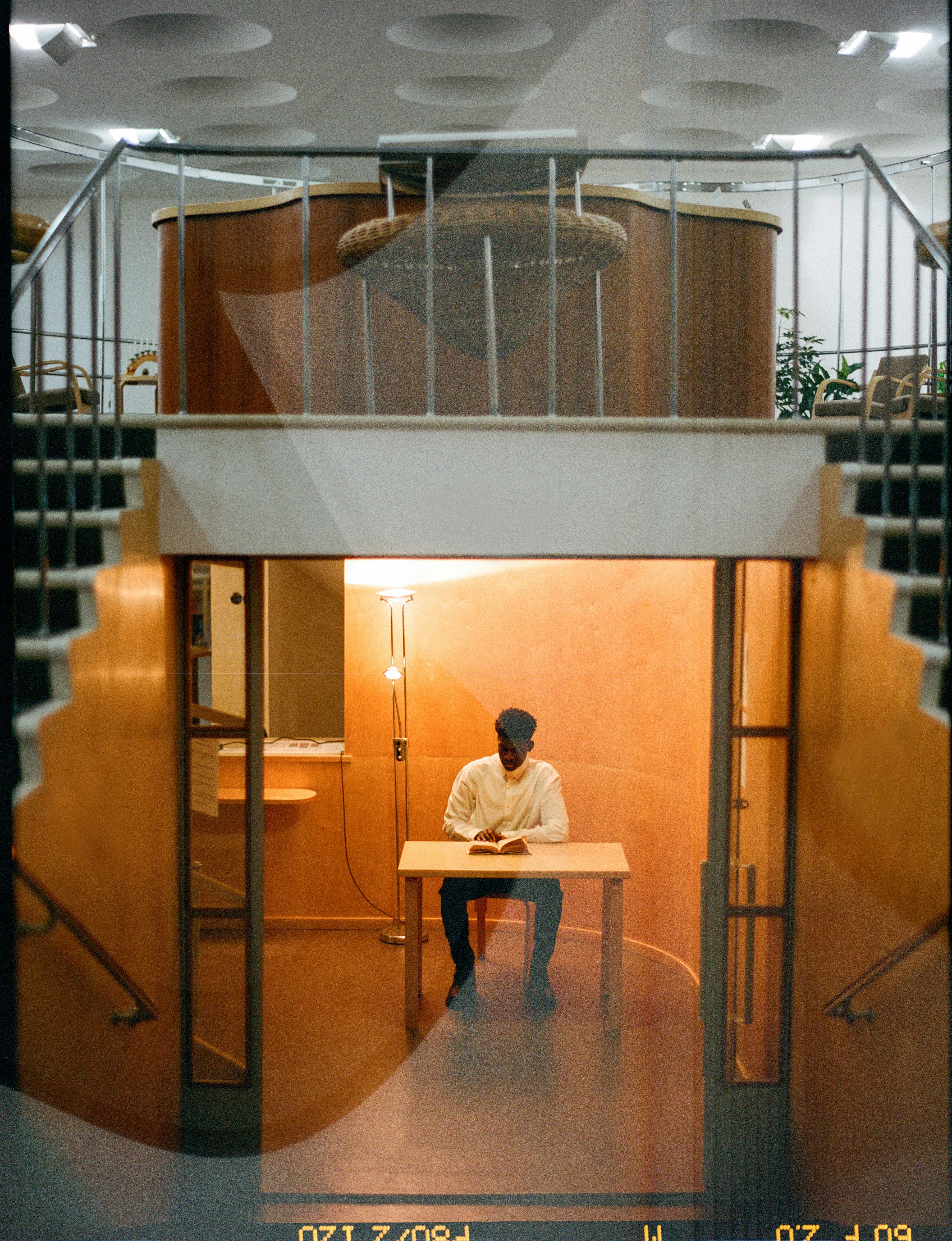 A Man Sitting at the Table · Free Stock Photo
