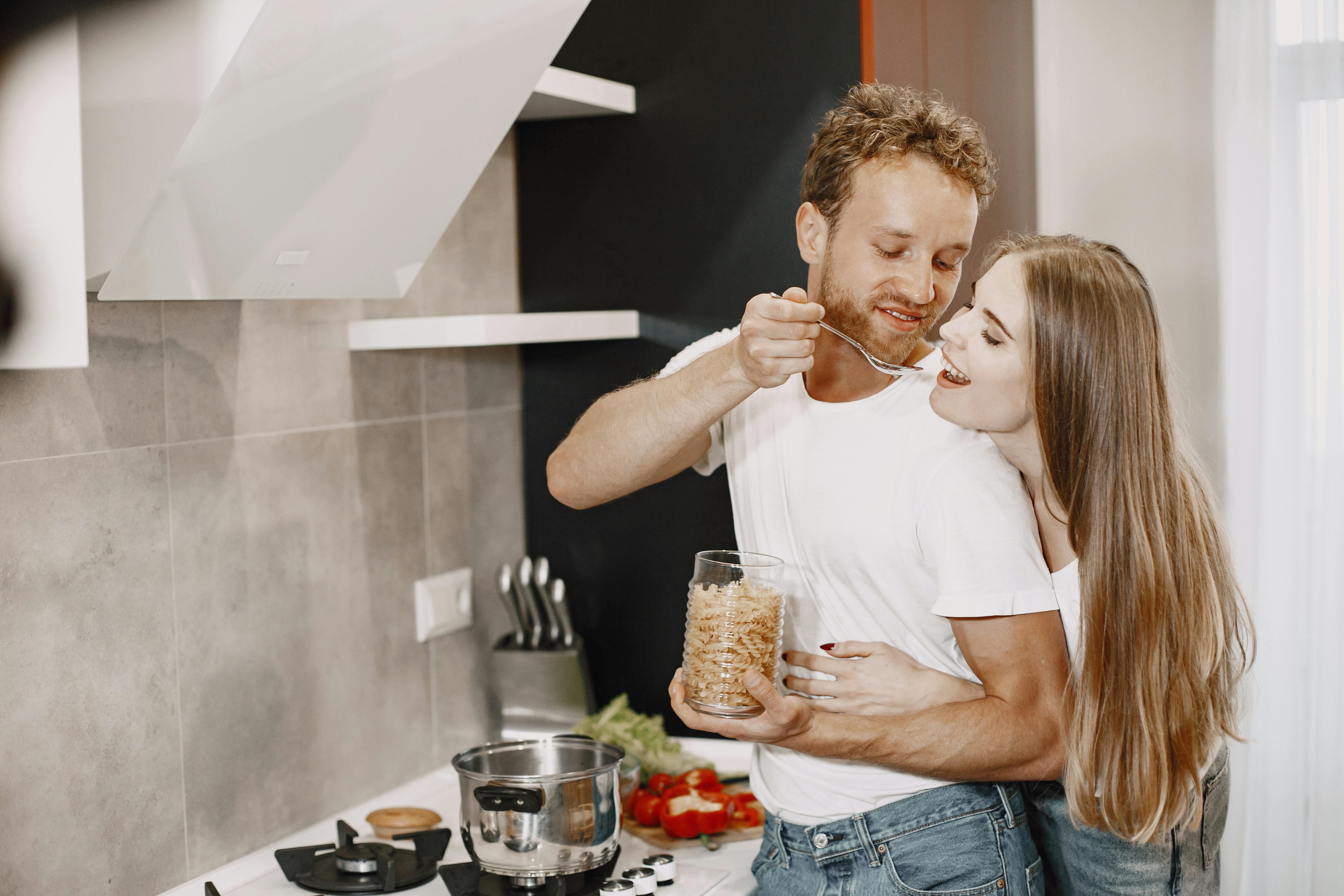A Couple in the Kitchen Together · Free Stock Photo