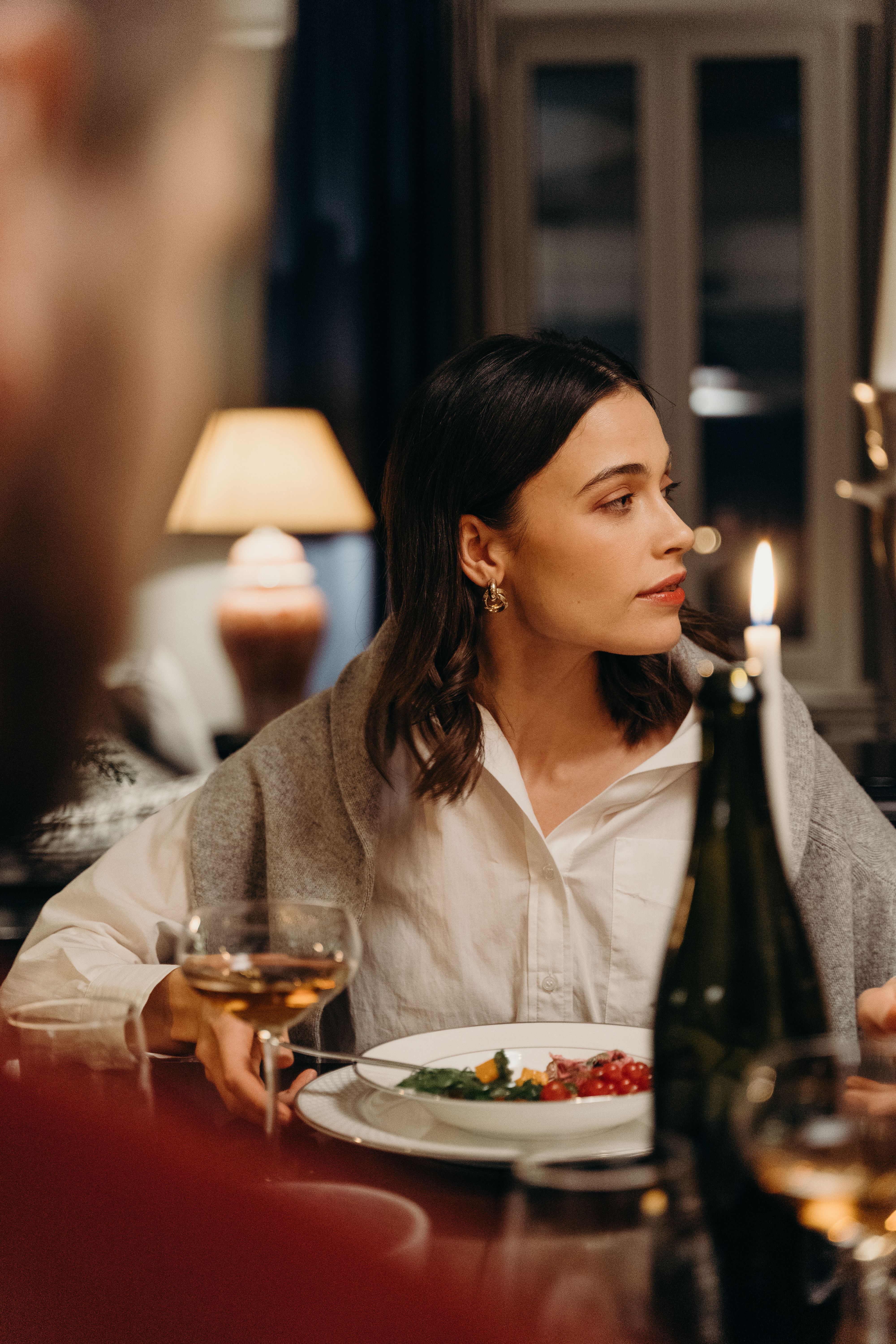 A Woman Sitting on a Dining Table · Free Stock Photo