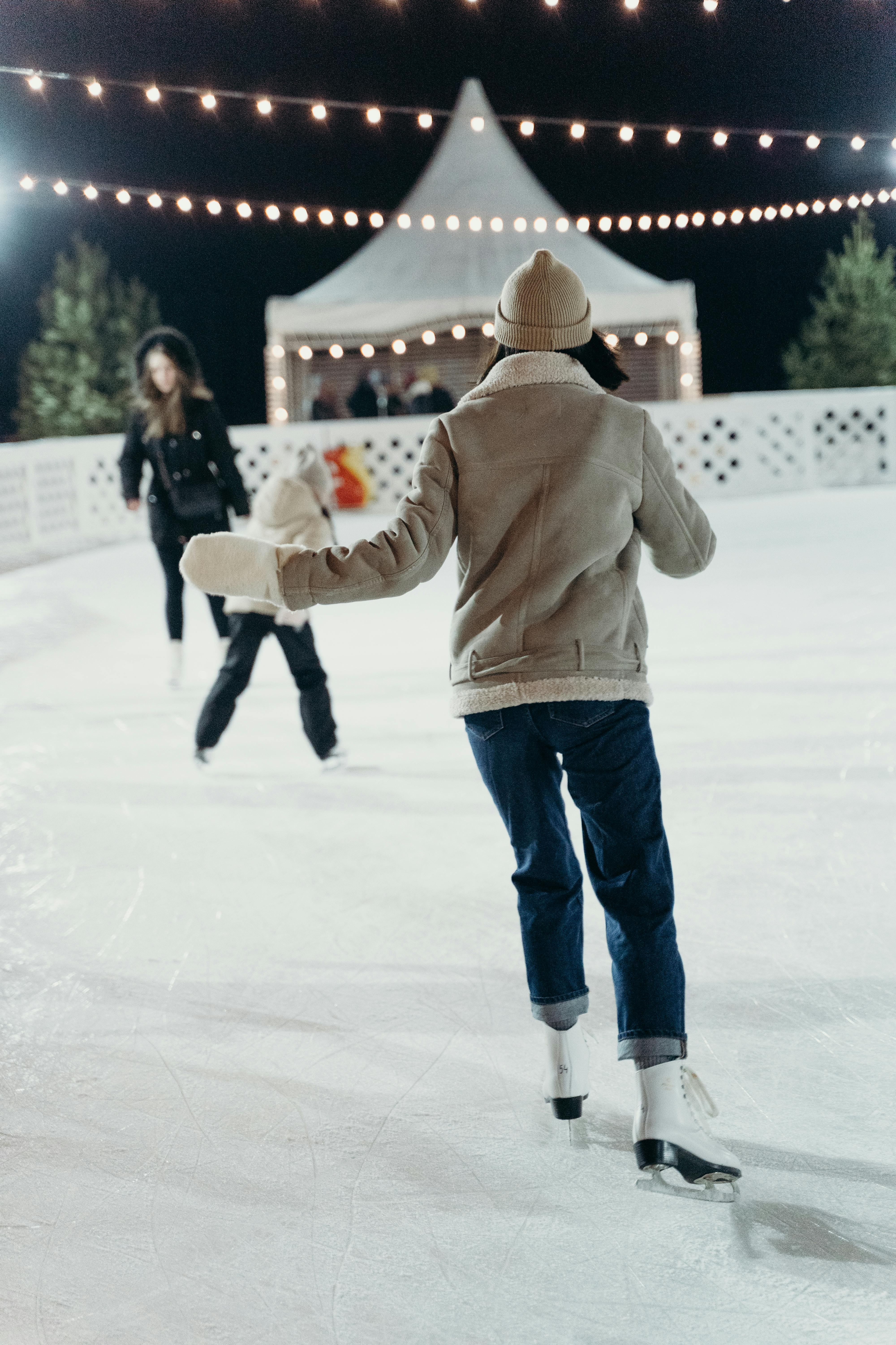 Back View of a Person Doing Ice Skating · Free Stock Photo