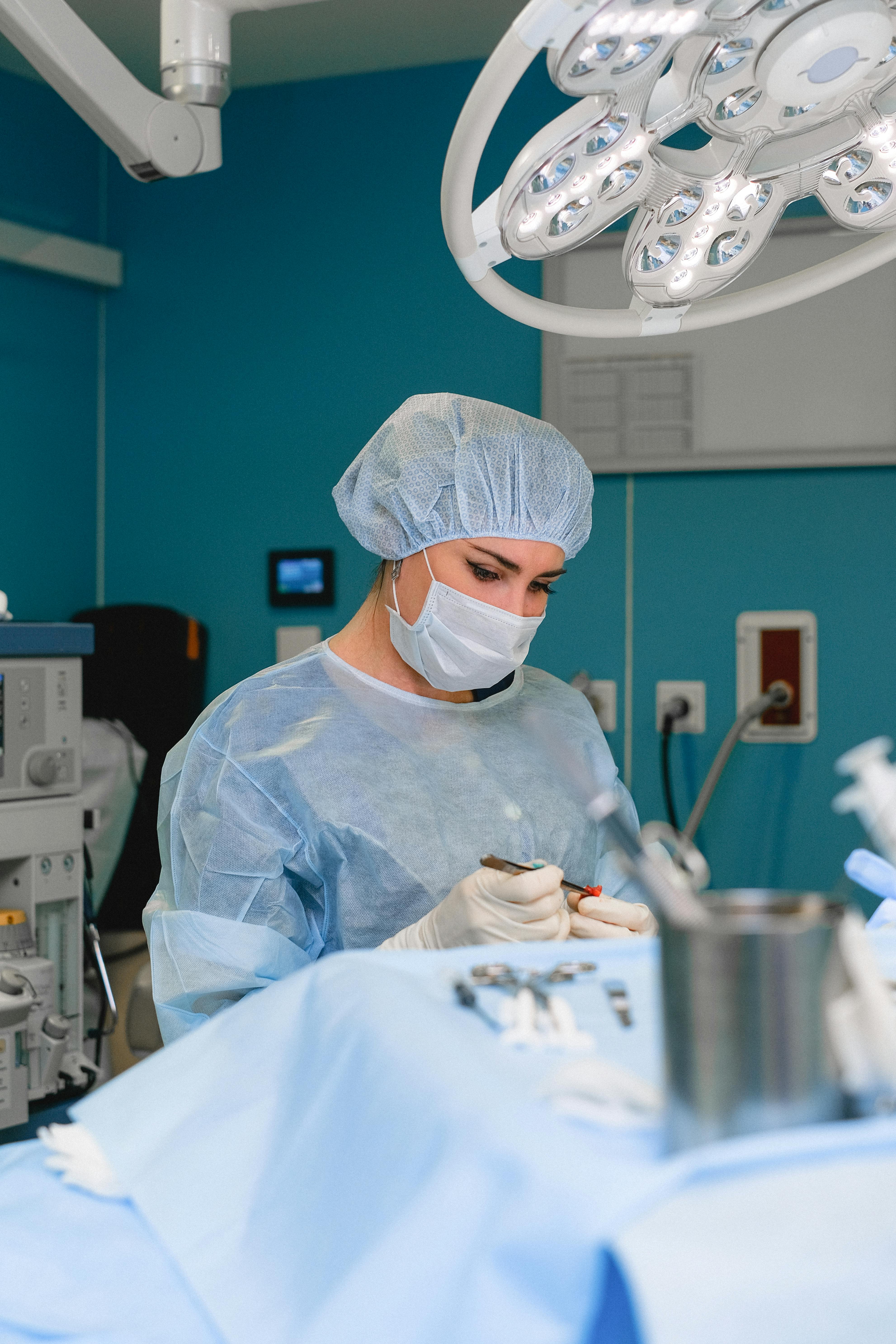 Surgeon Inside a Operating Room · Free Stock Photo
