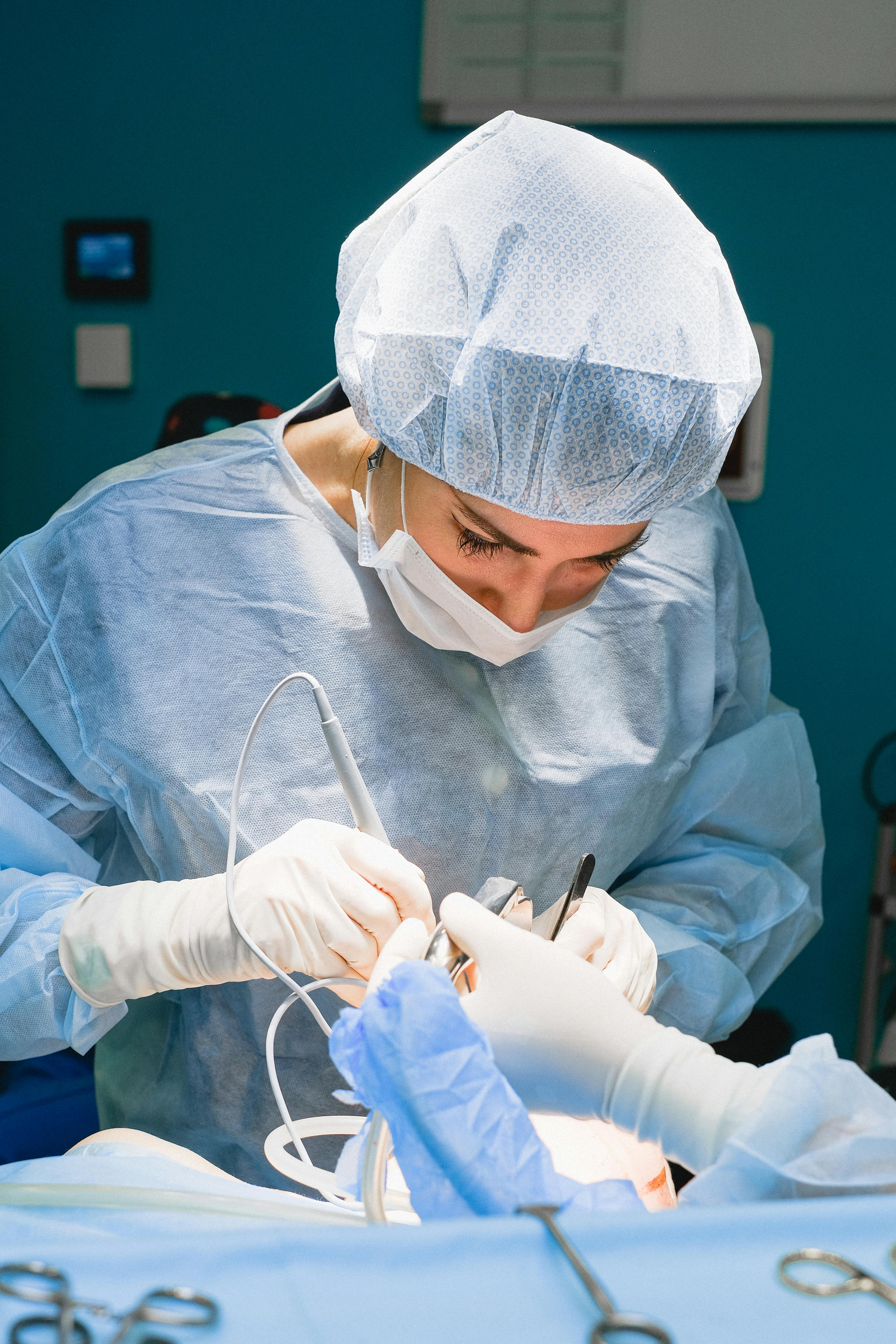 Surgeon During Surgery · Free Stock Photo