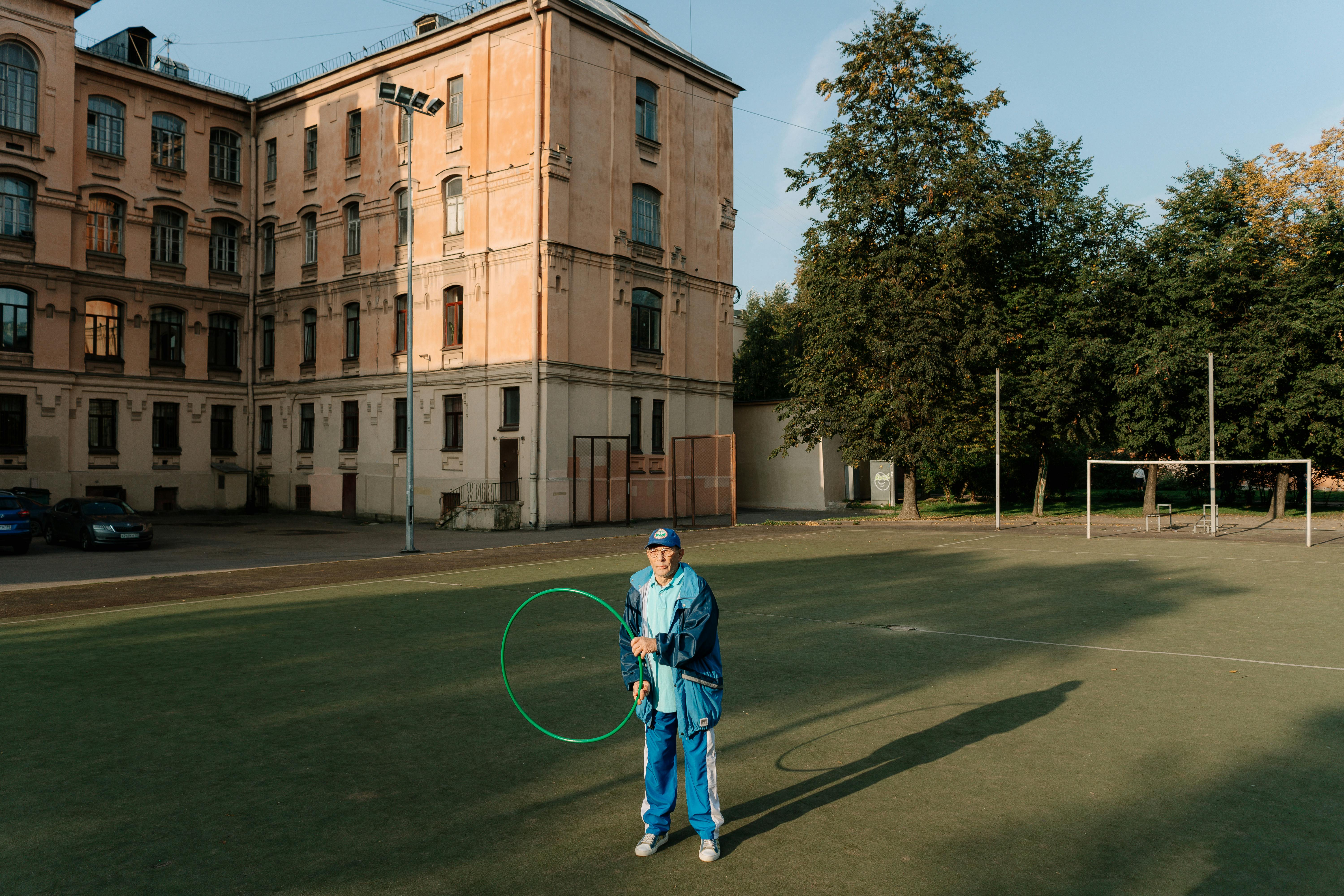 Man Holding a Hula hoop · Free Stock Photo