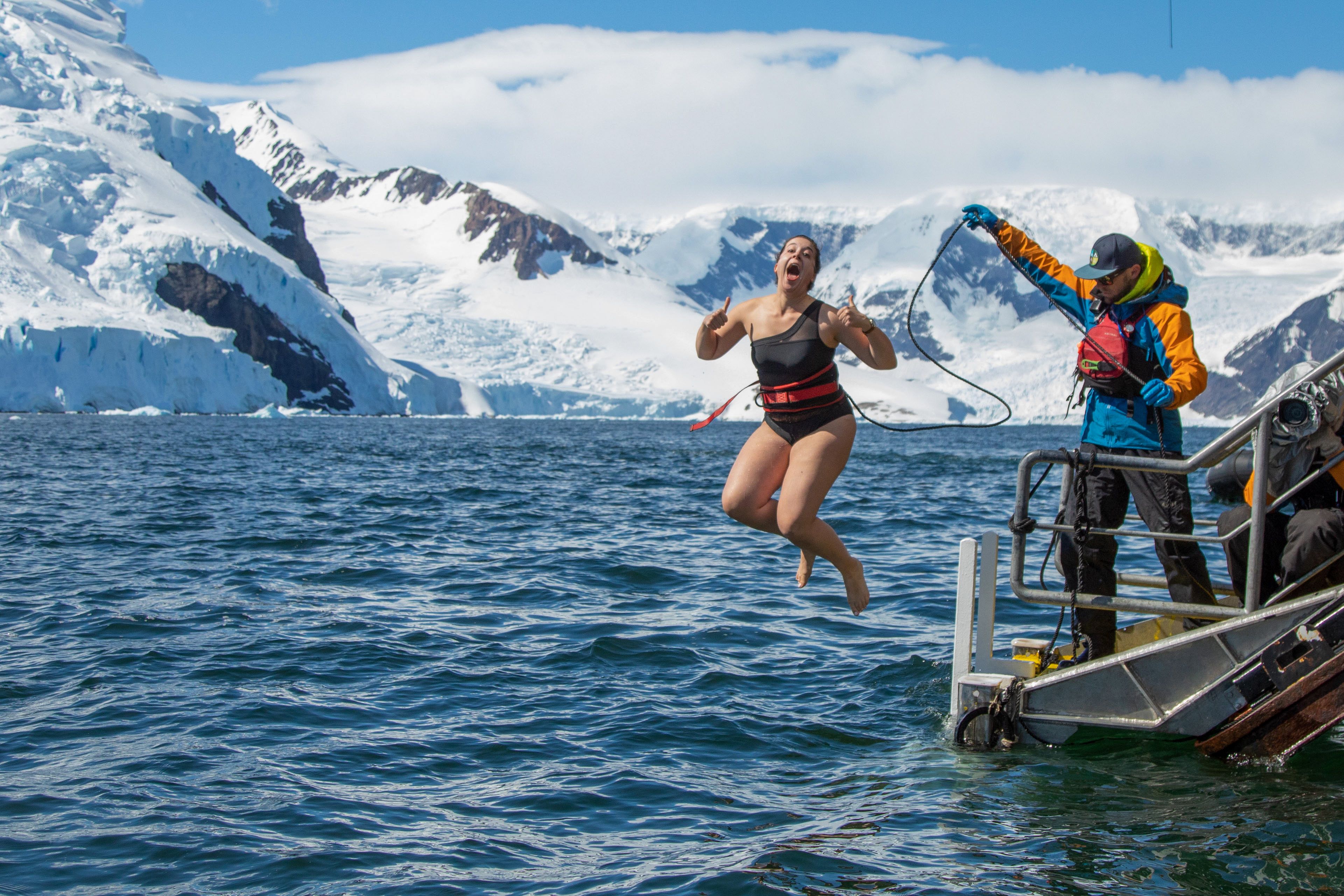 Woman in Black Swimsuit Jumping on Water · Free Stock Photo