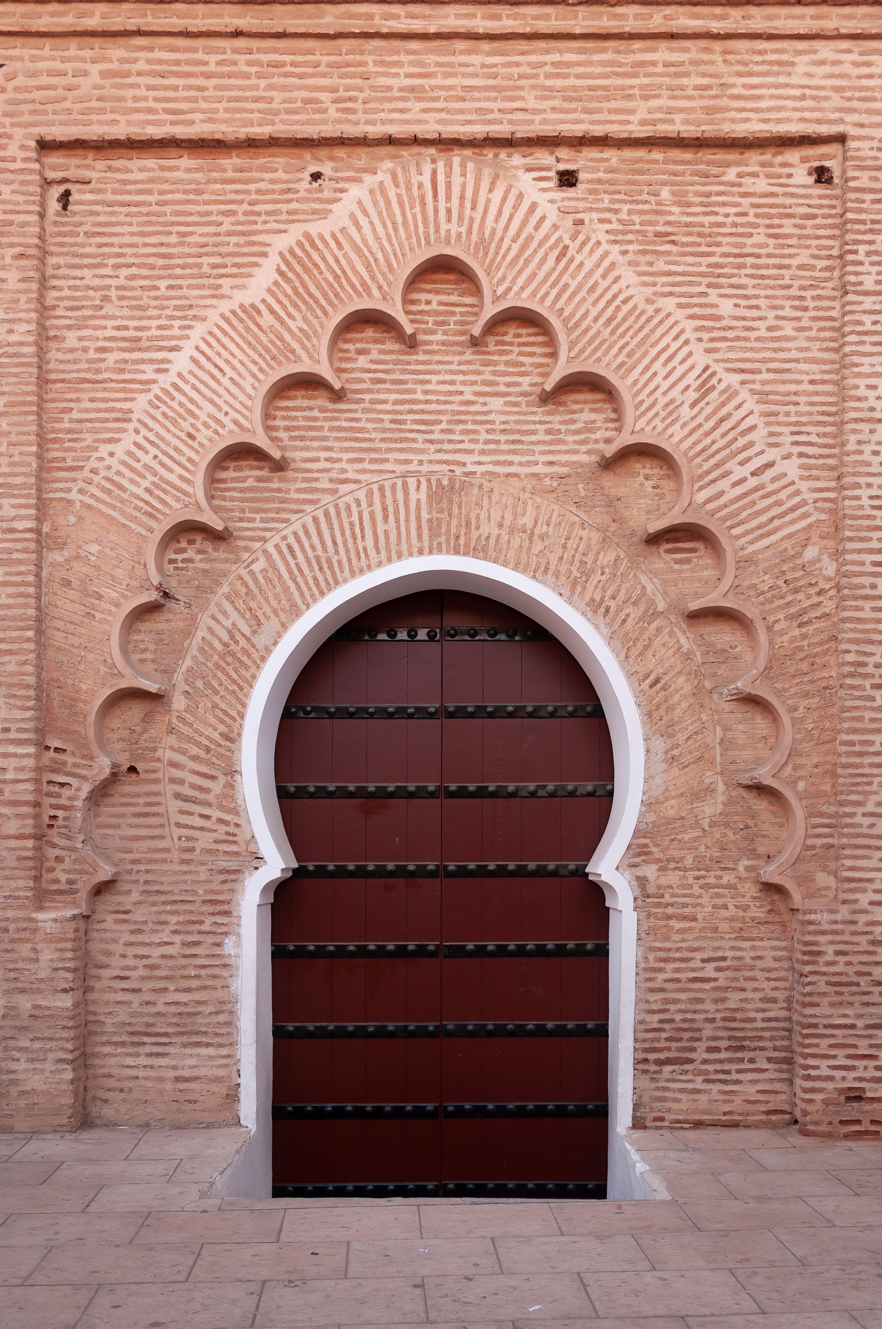 Group of Muslim Men in Traditional Outfits Trespassing Islamic Gate ...