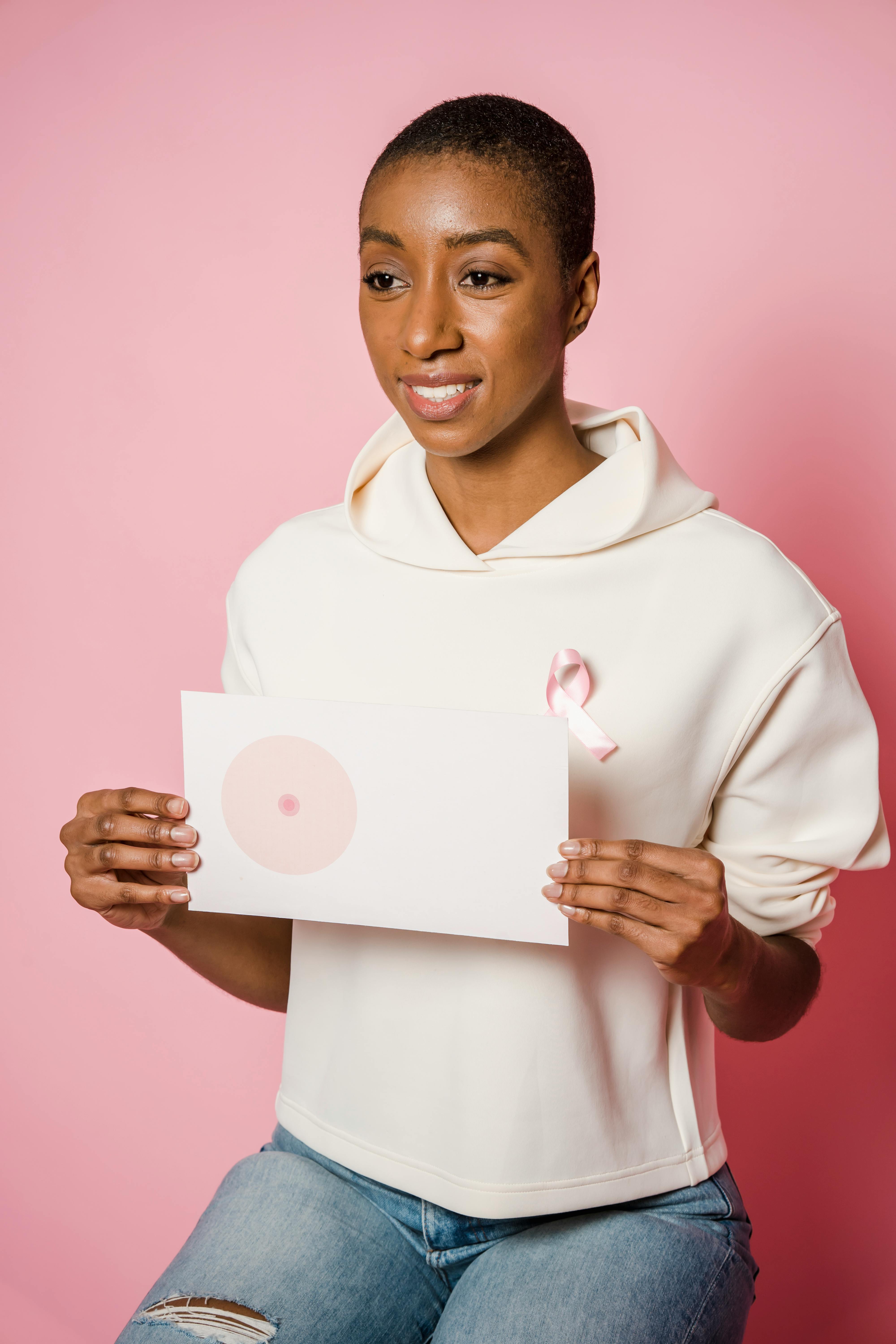Woman Wearing Pink Ribbon · Free Stock Photo
