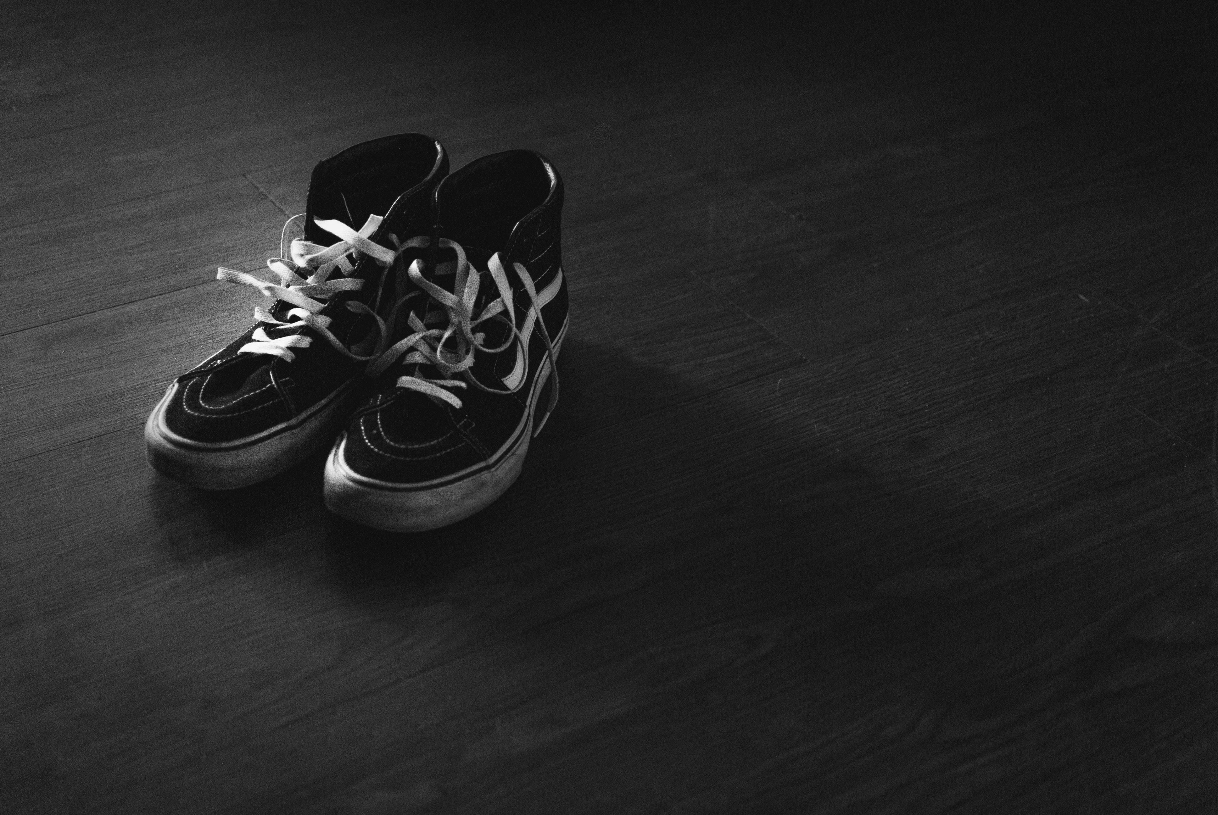 Grayscale Photography Of High-top Sneakers · Free Stock Photo