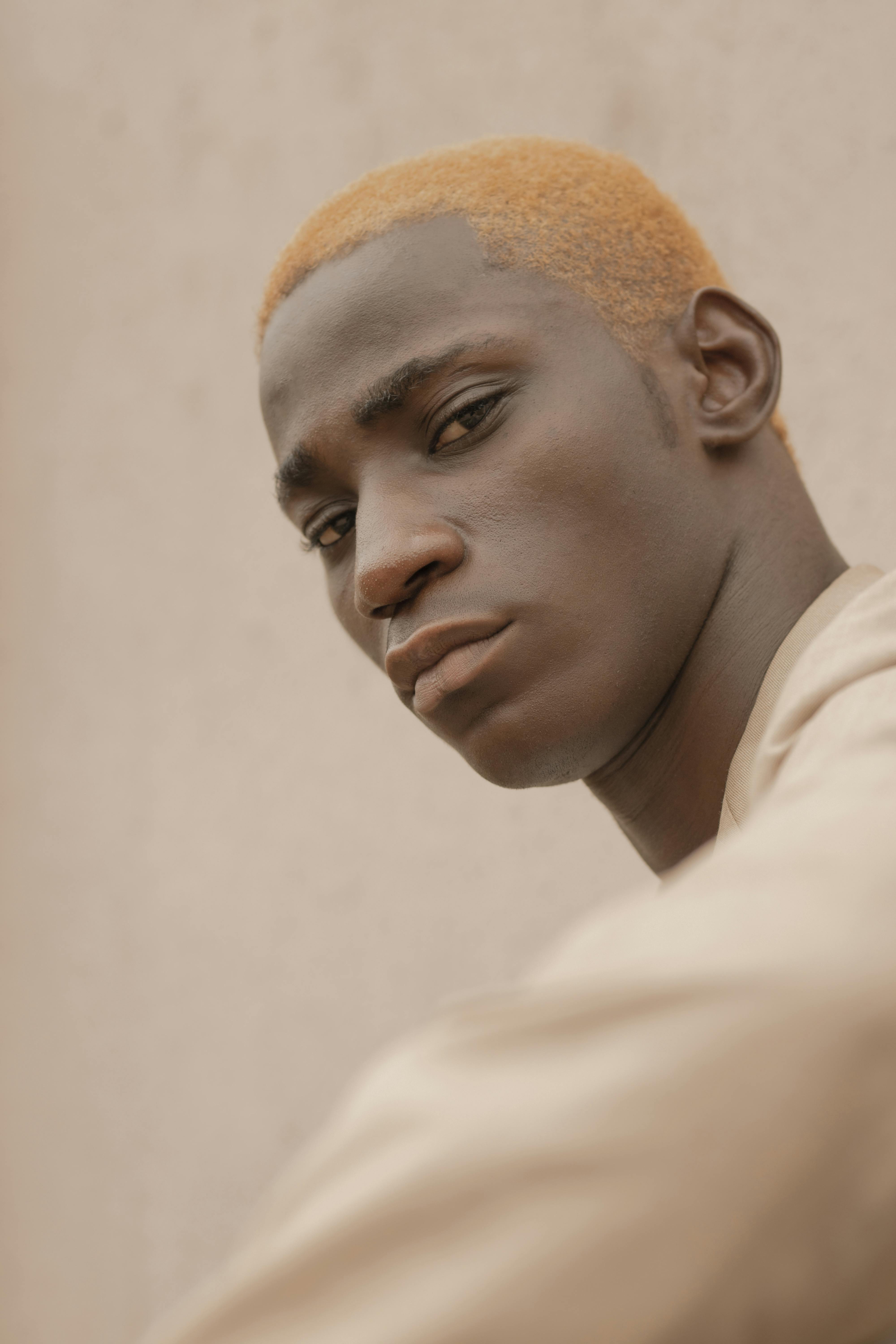 Man with Yellow Hair Posing · Free Stock Photo