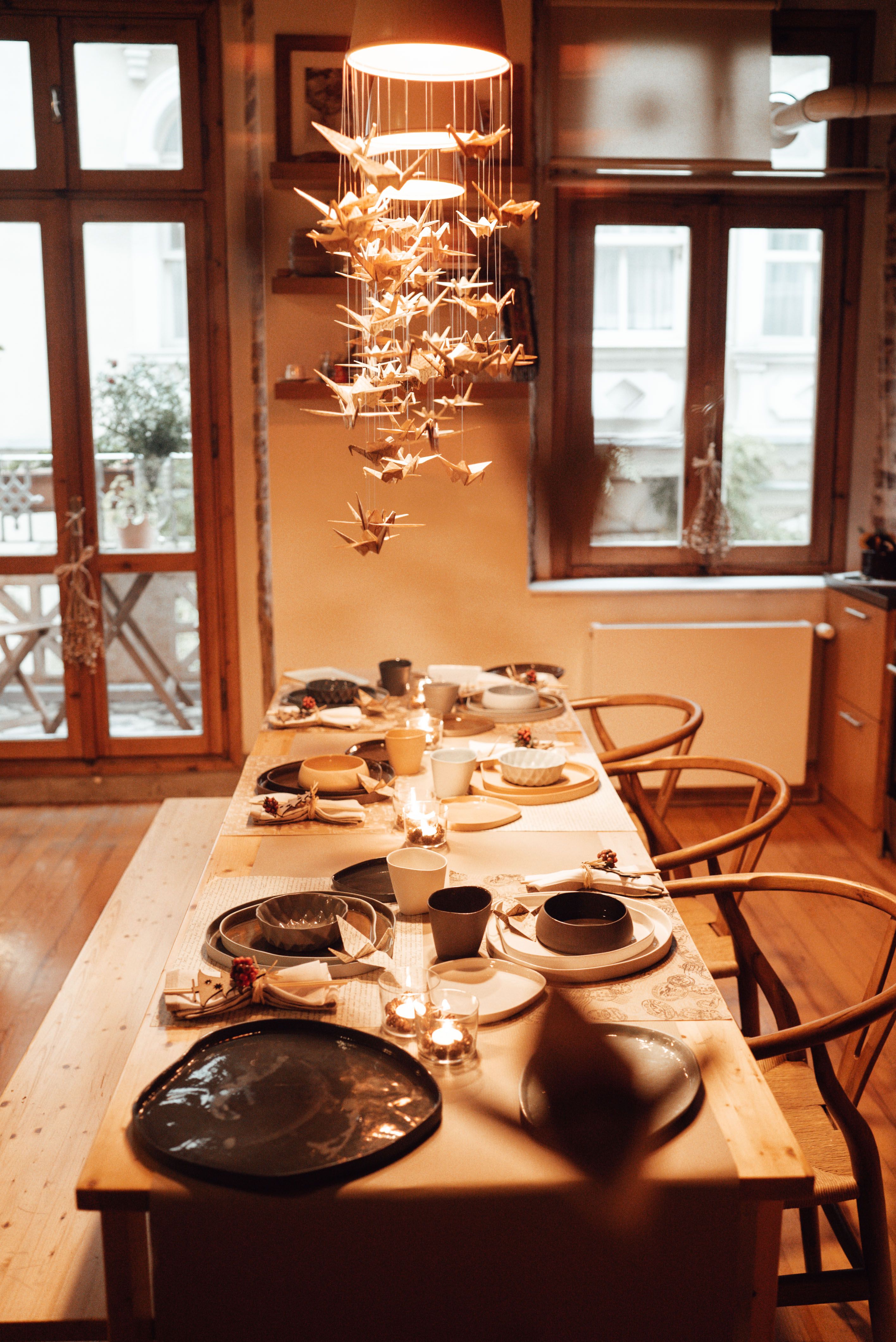 Interior of dining room with served table and orizurus · Free Stock Photo