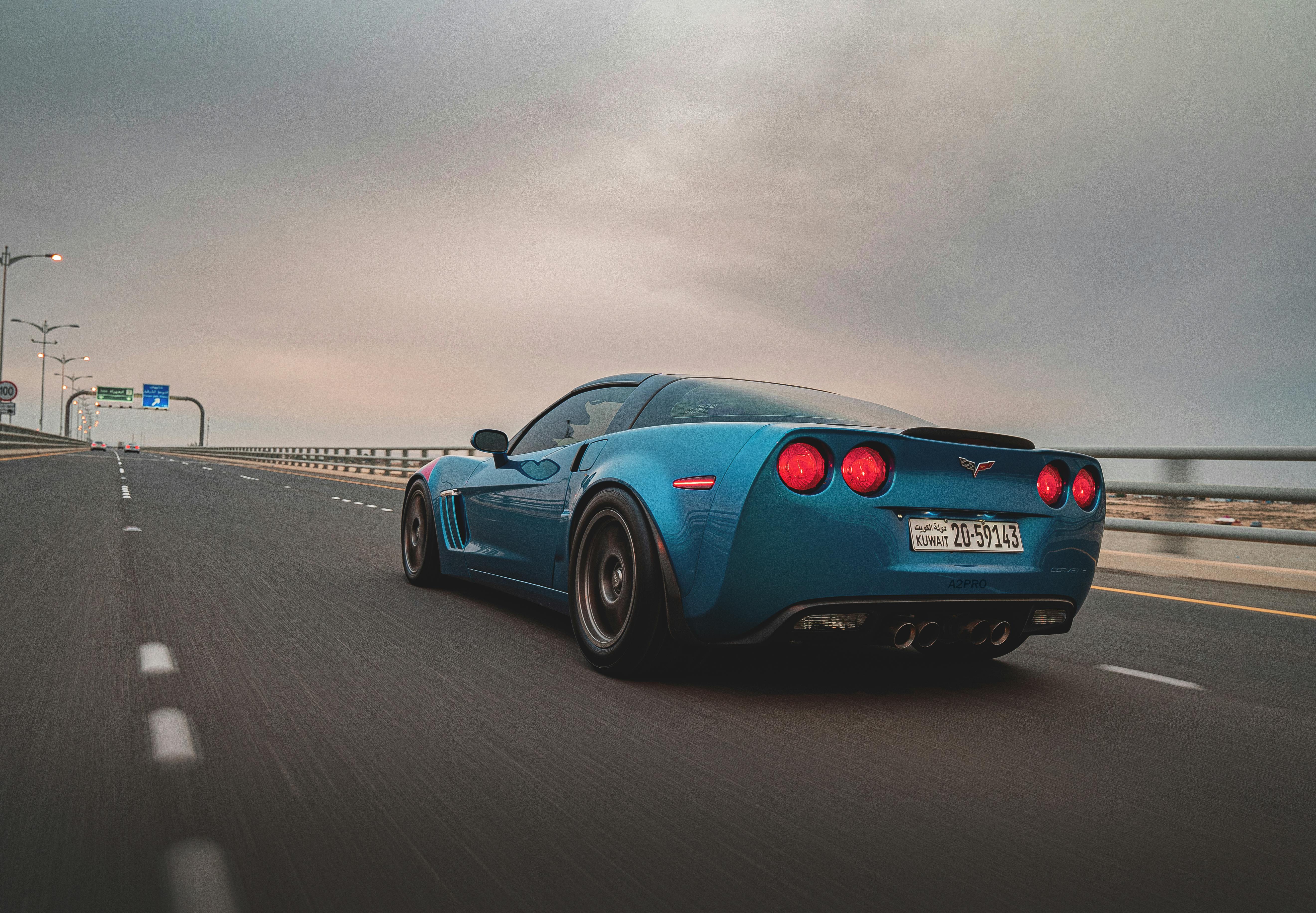 Blue Car on the Road · Free Stock Photo