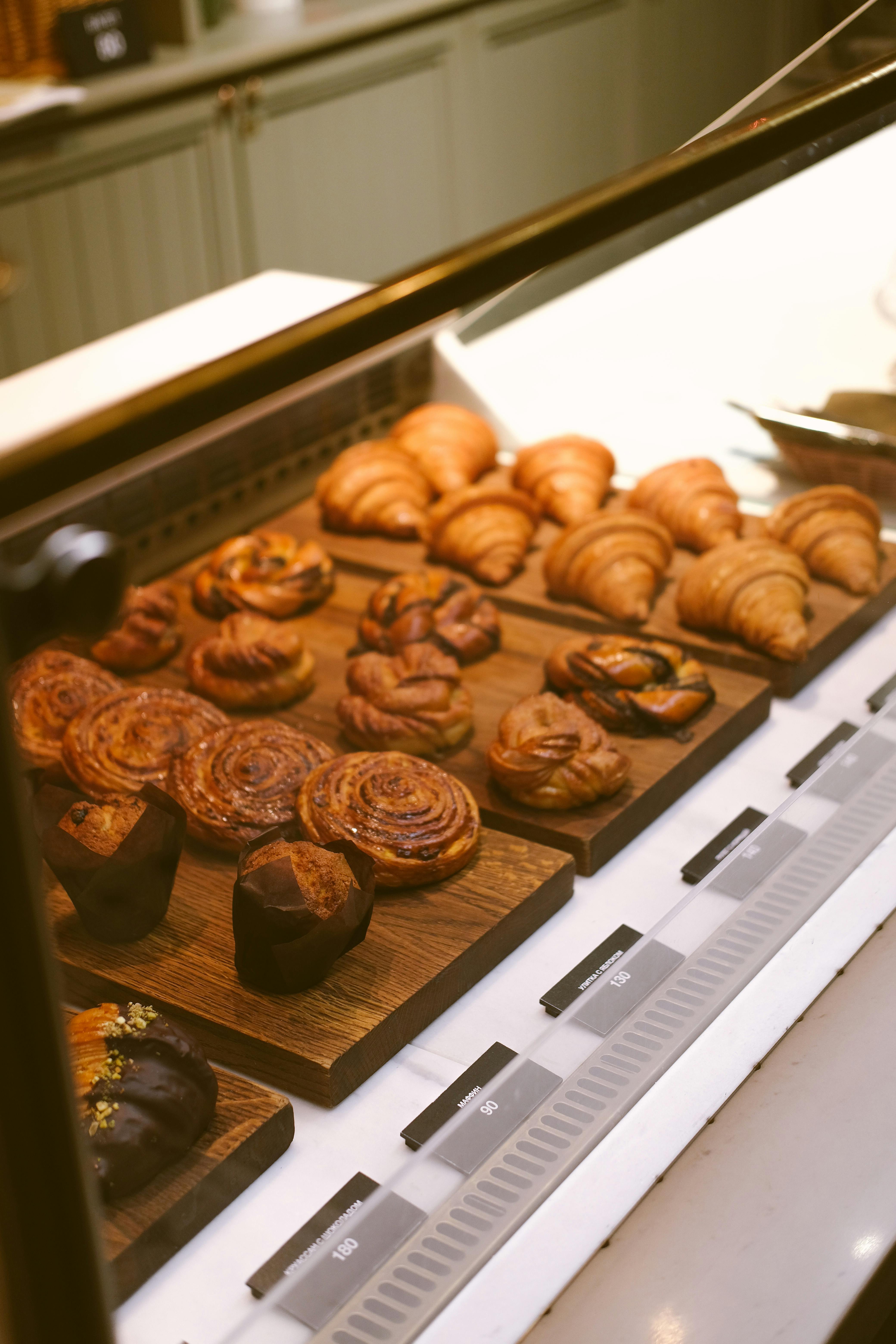 Pastries On Clear Glass Display Counter · Free Stock Photo