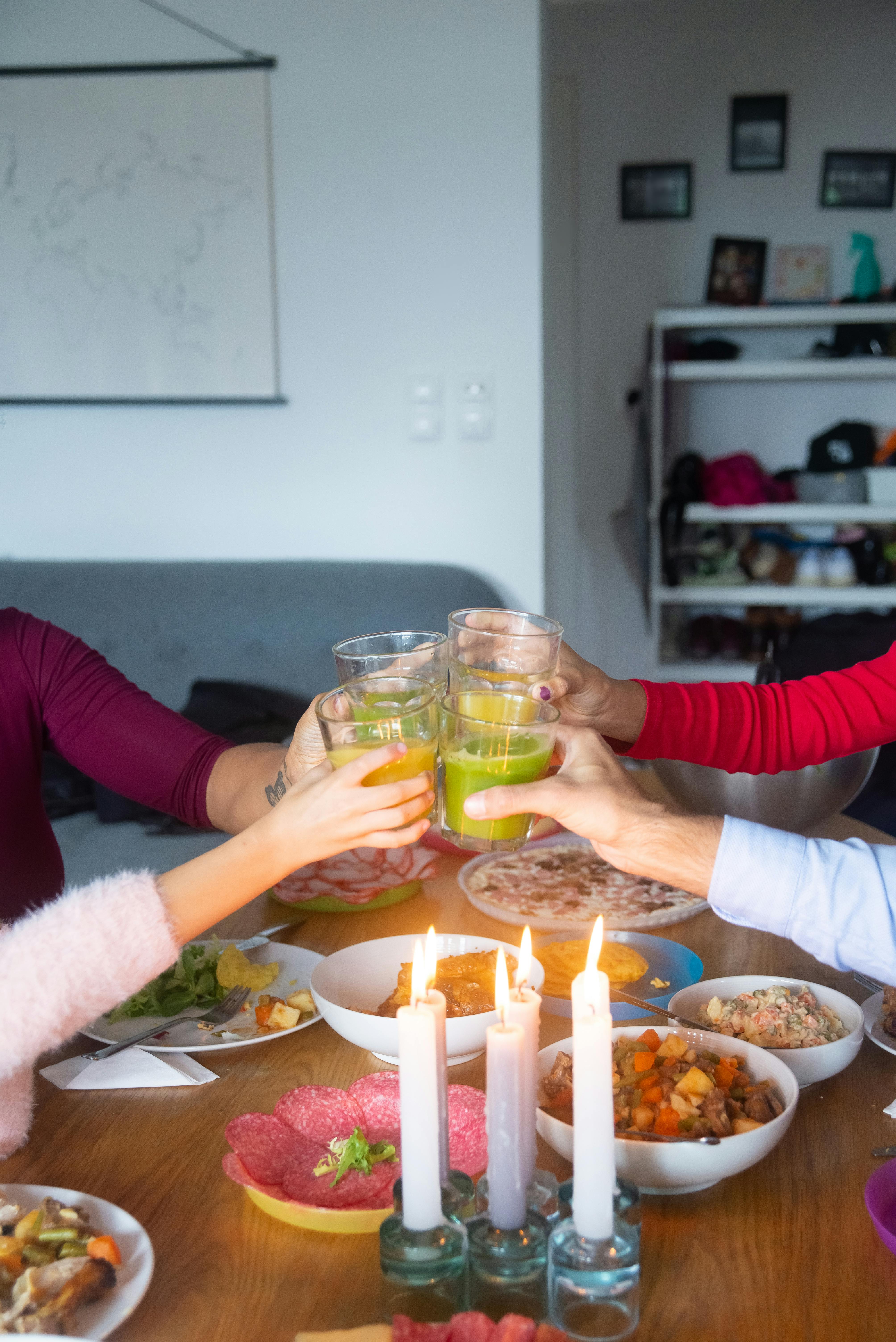 People Doing a Toast at a Dinner Table · Free Stock Photo
