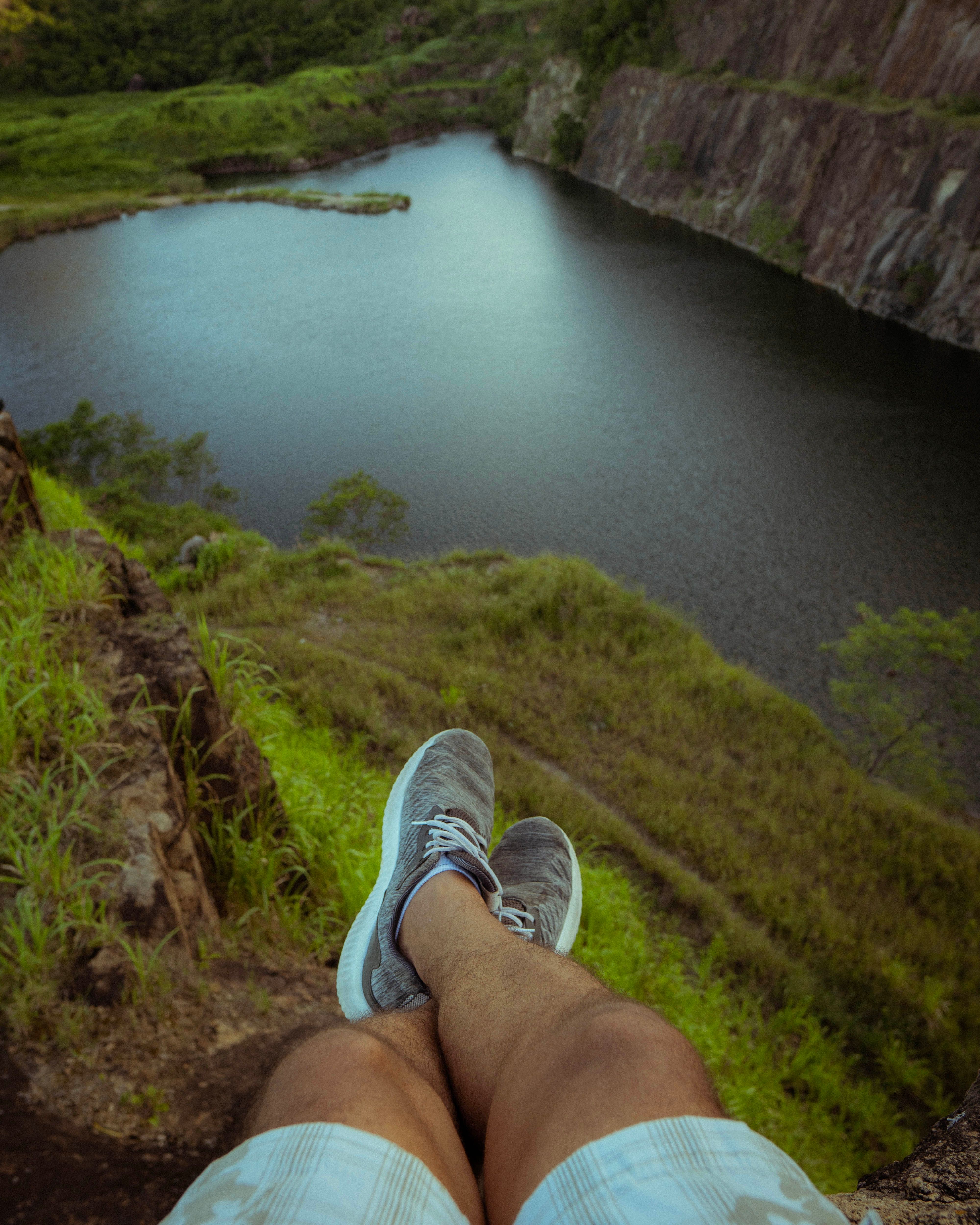 Person Standing on a Brown Wood Log Floating on a Body of Water · Free ...